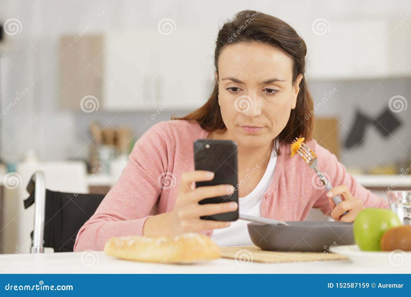 Pensive Woman Texting while Eating Stock Image - Image of girl, social ...