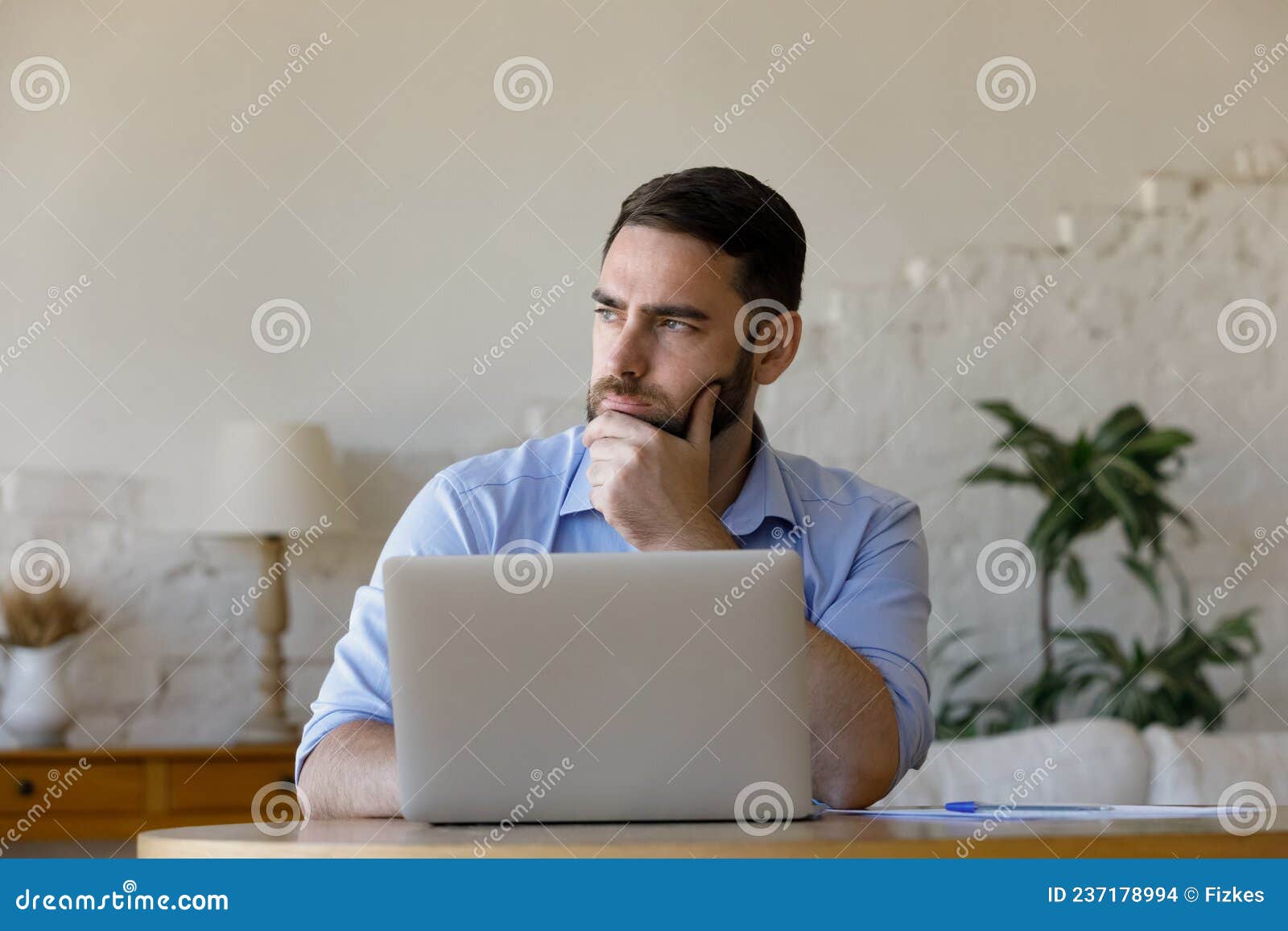 Pensive Young Businessman Considering Problem Solution. Stock Photo ...