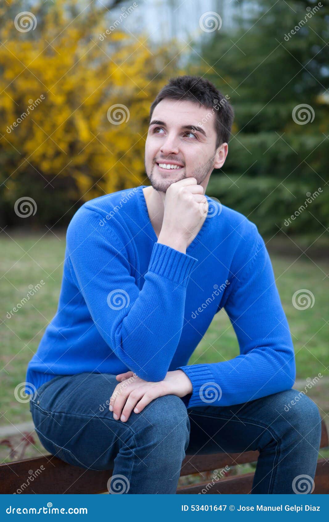 Pensive Young Cool Man Sitting on a Bank Stock Image - Image of ...