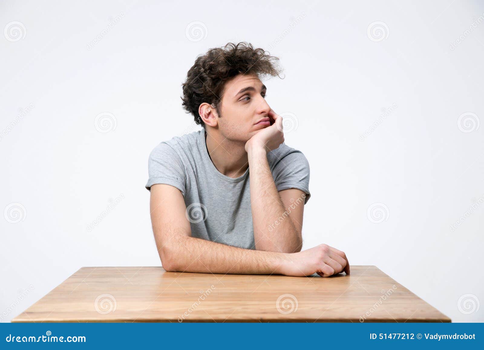 Pensive Young Man Sitting at the Table Stock Photo - Image of beautiful ...