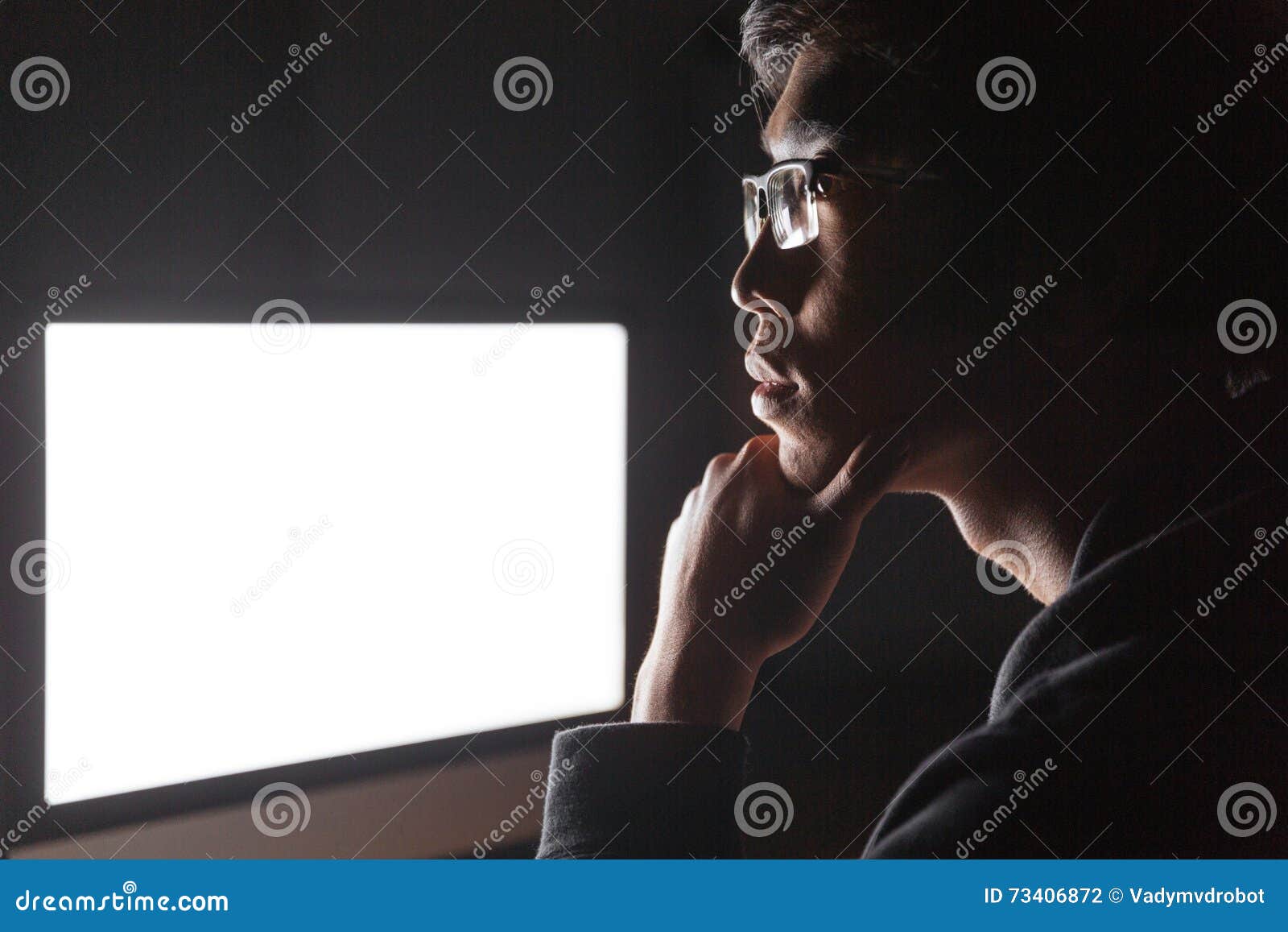 Pensive Young Man Thinking and Using Blank Screen Computer Stock Photo ...