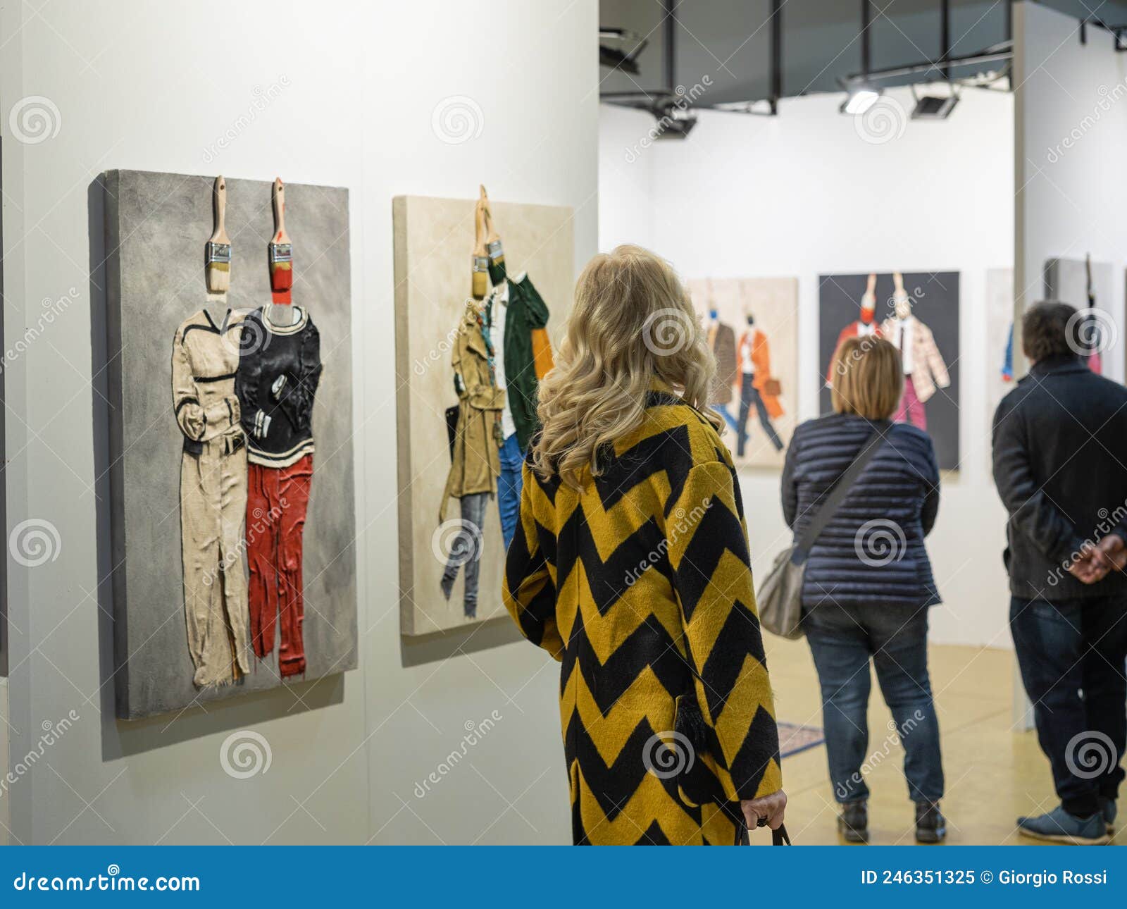 People Admiring Paintings in a Modern Art Gallery Editorial Image ...