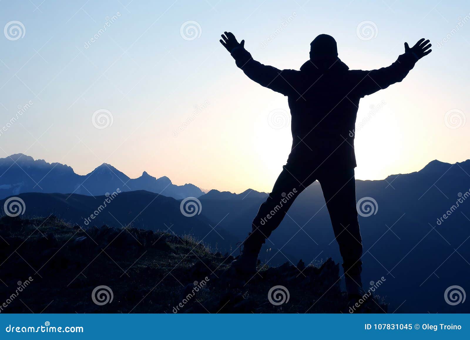 People with Arms Raised Standing on the Mountain at Dawn Stock Image ...