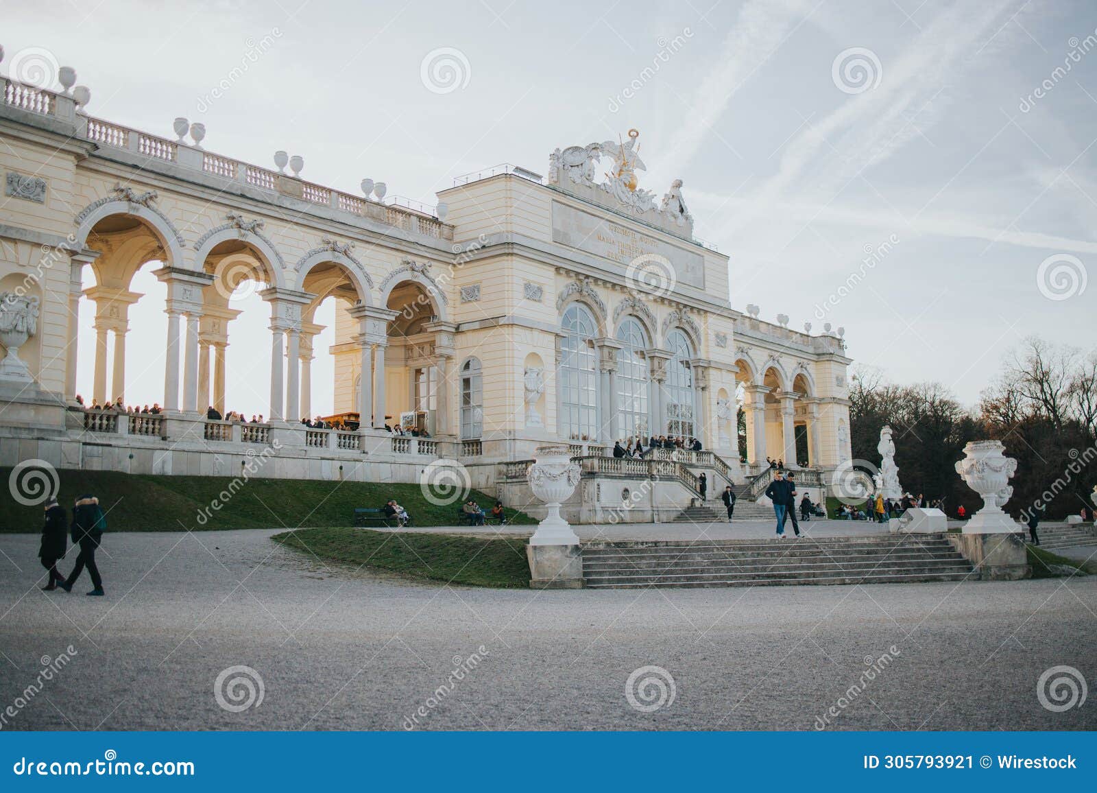 People Walking Up a Path with Many Statues and Steps in Front Editorial ...