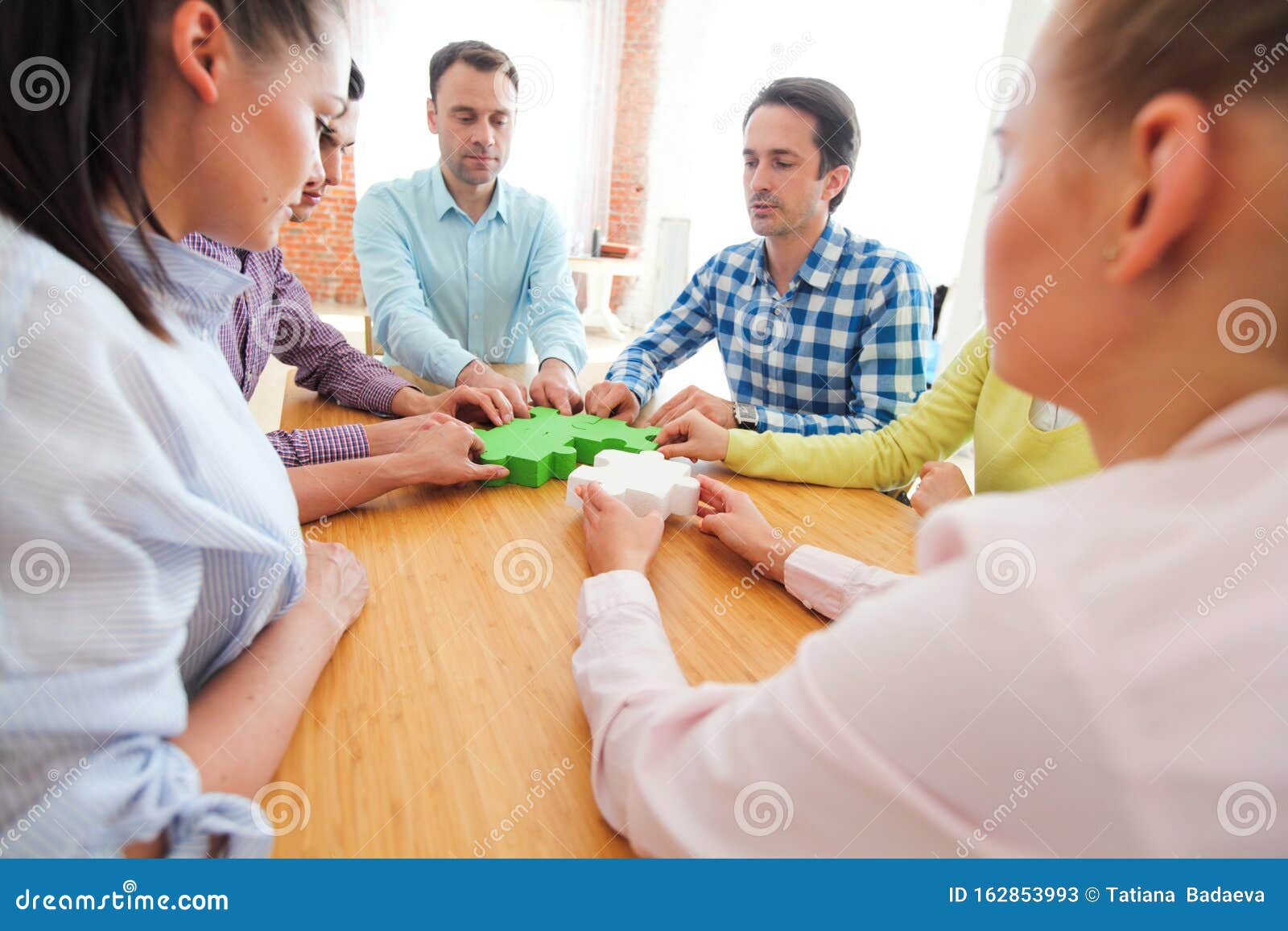 People Assembling Jigsaw Puzzle Stock Image - Image of group, concept ...