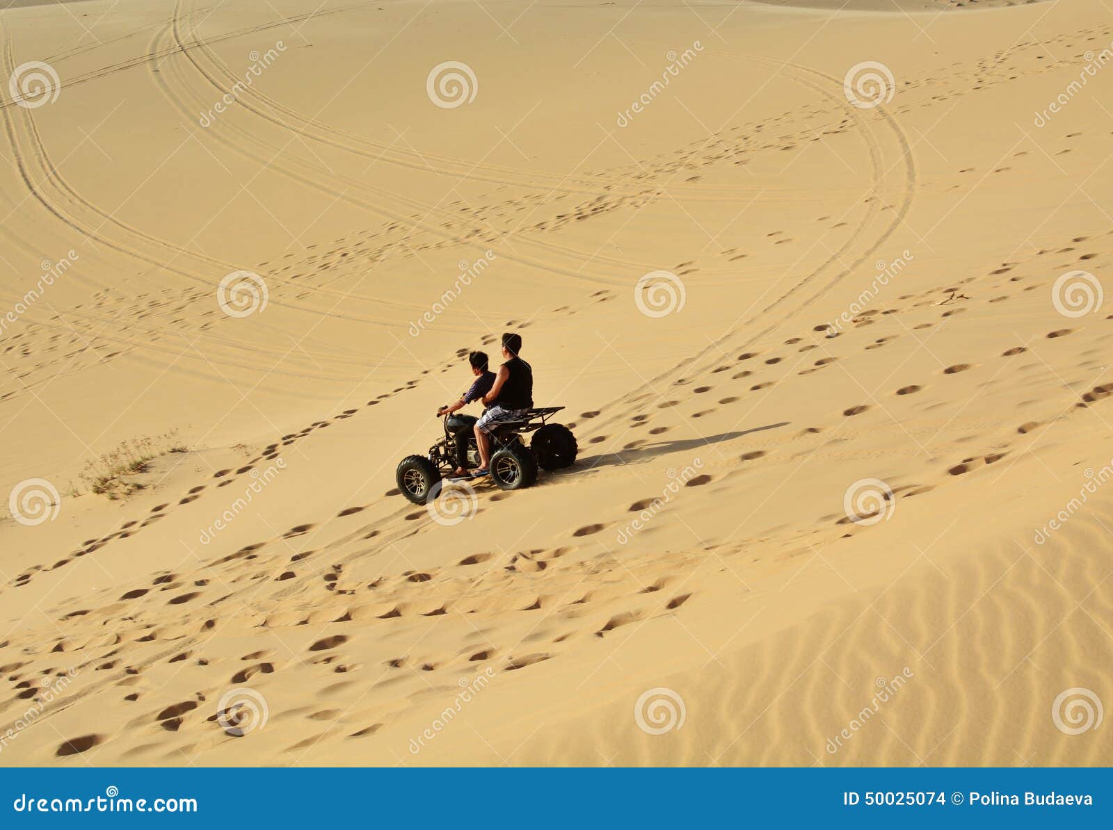 People on ATV in desert editorial stock image. Image of driver - 50025074