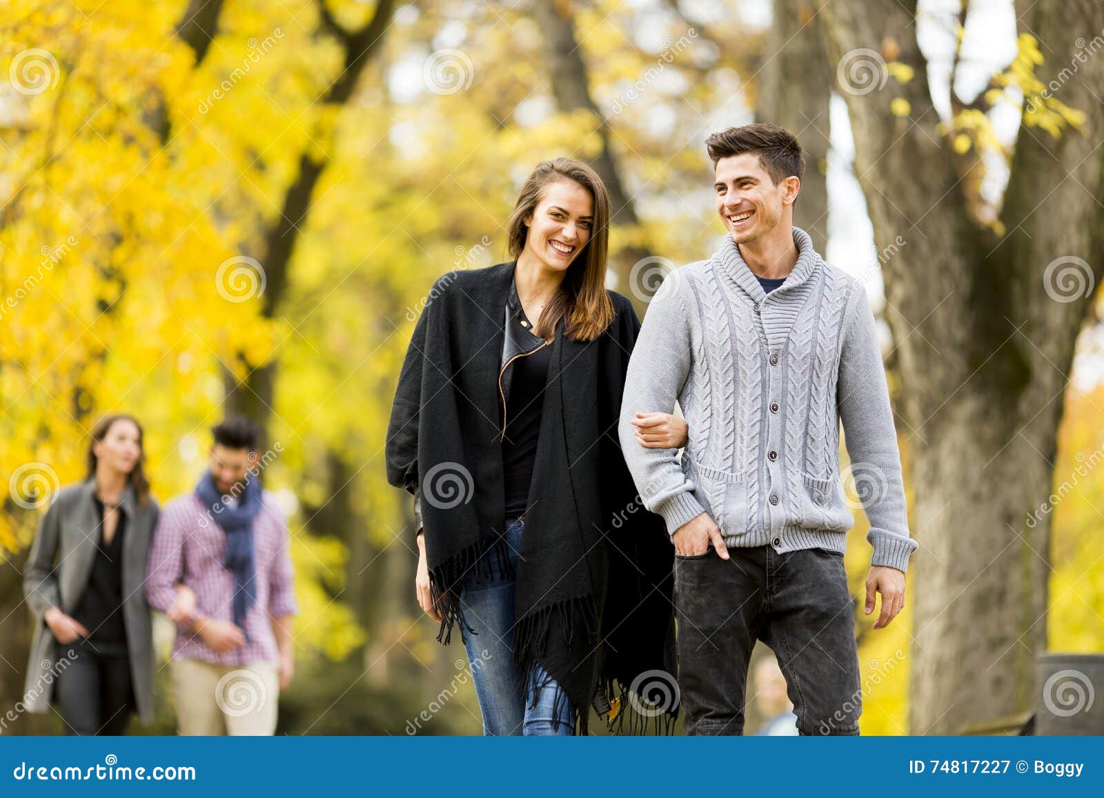 People in autumn park stock image. Image of person, leaf - 74817227