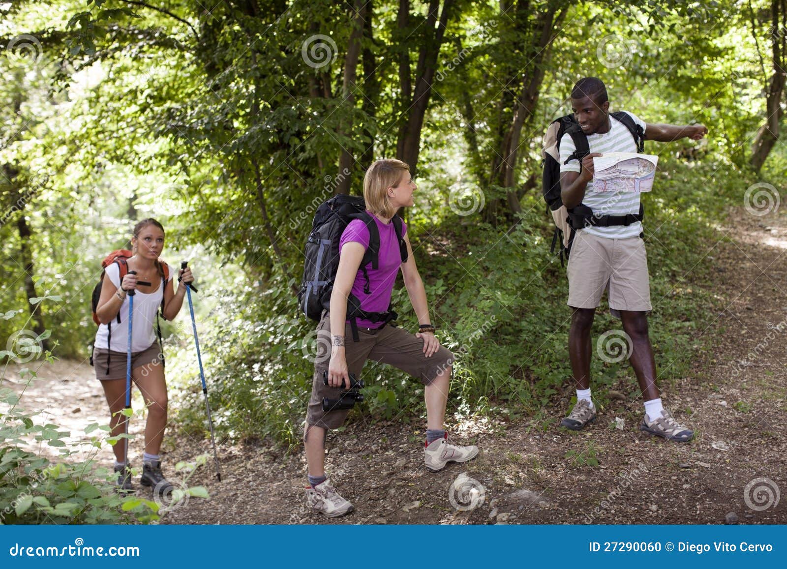 People with Backpack Doing Trekking in Wood Stock Photo - Image of ...