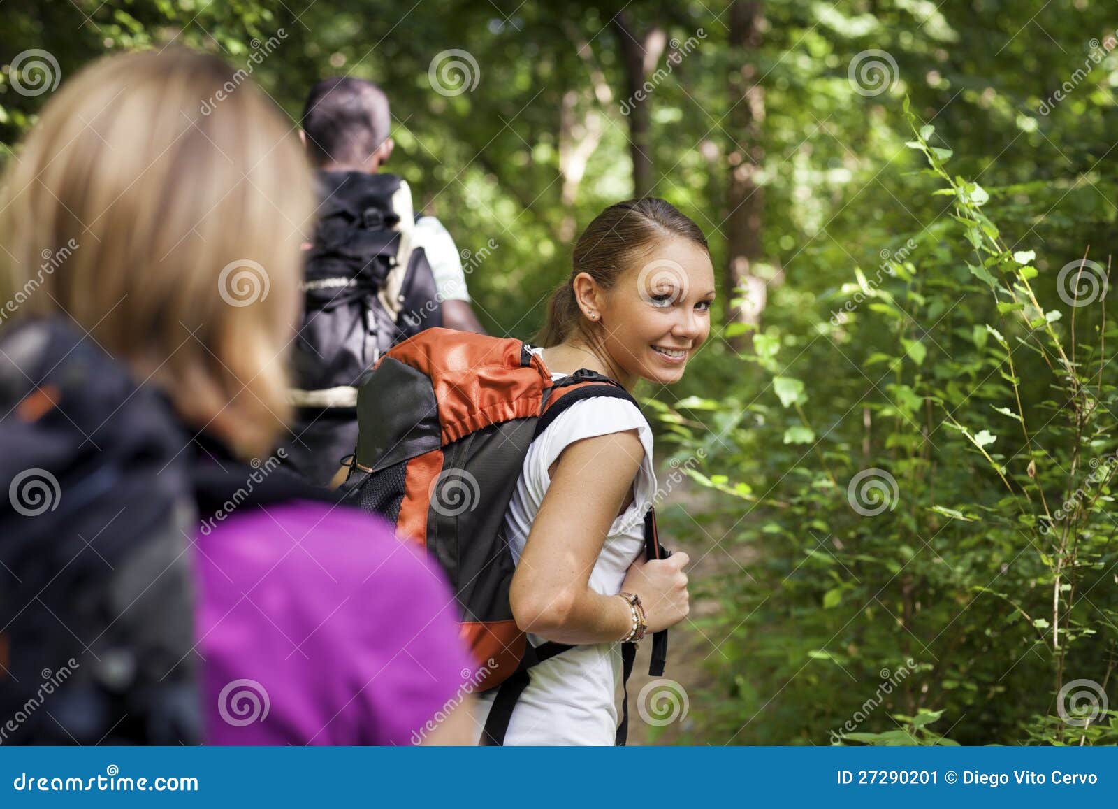 People with Backpack Doing Trekking in Wood Stock Image - Image of ...