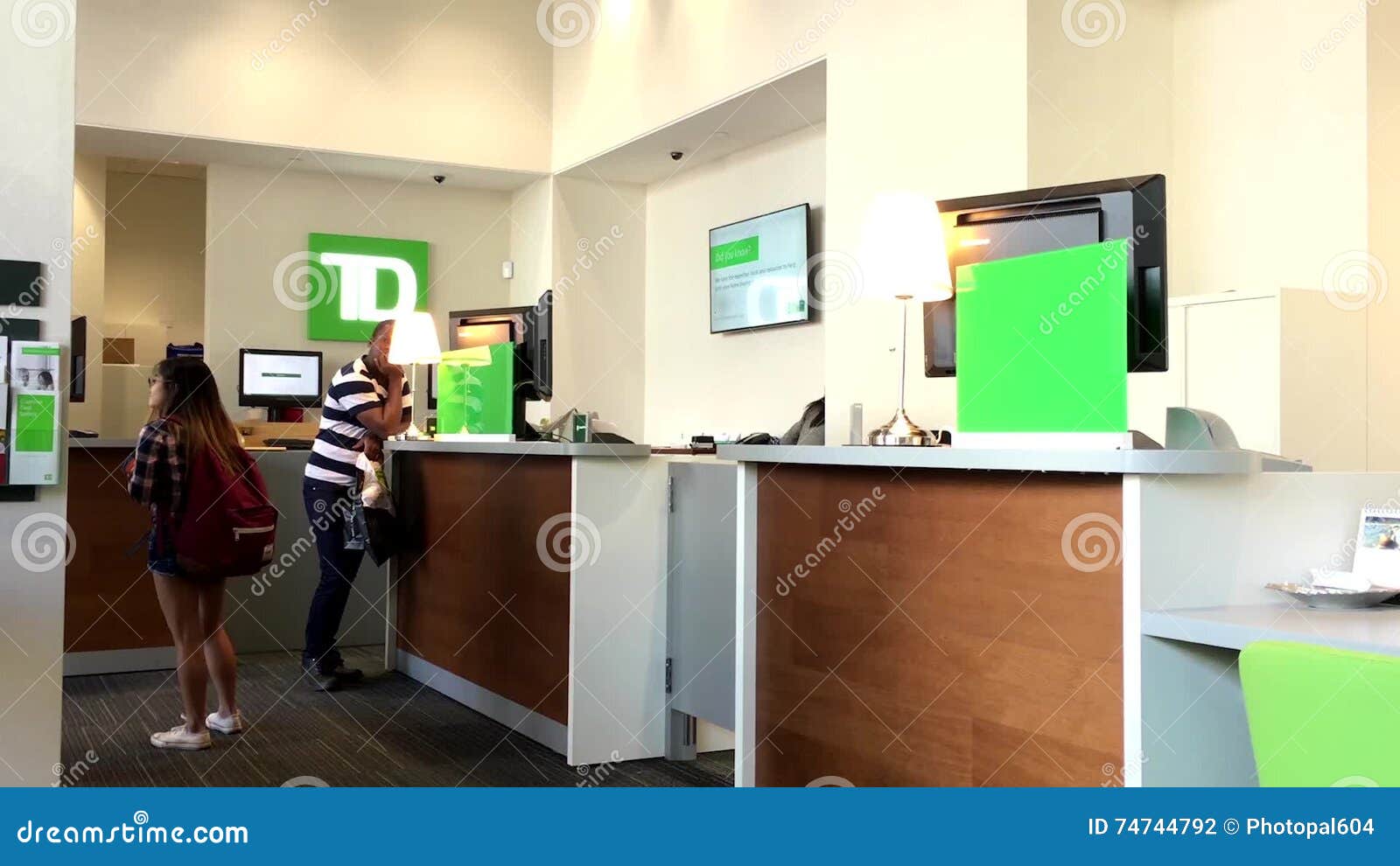 People at a Bank Counter Talking To the Teller Stock Footage - Video of ...