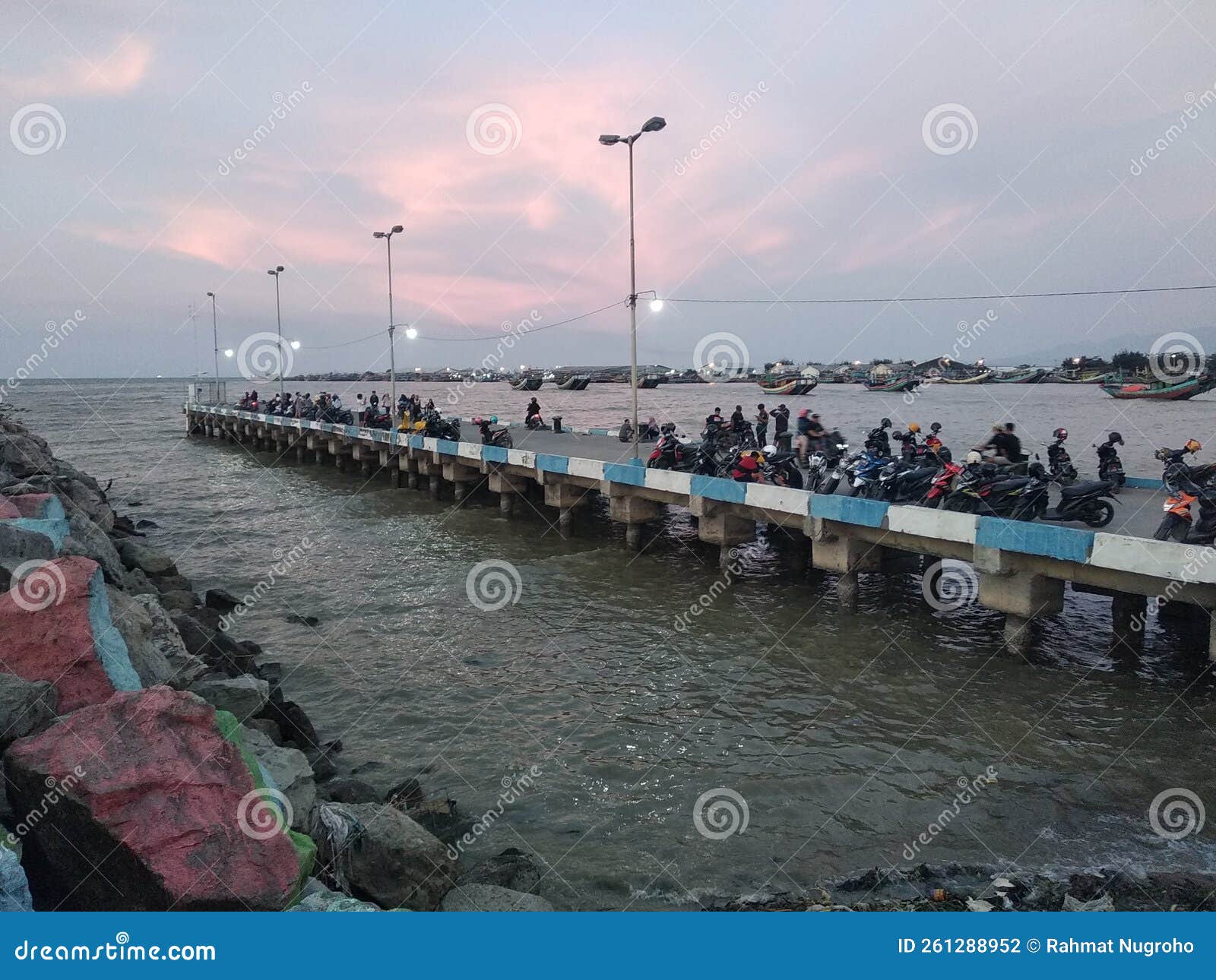 People on the Beach at Dusk, Central Java, Indonesia, July 12, 2022 ...