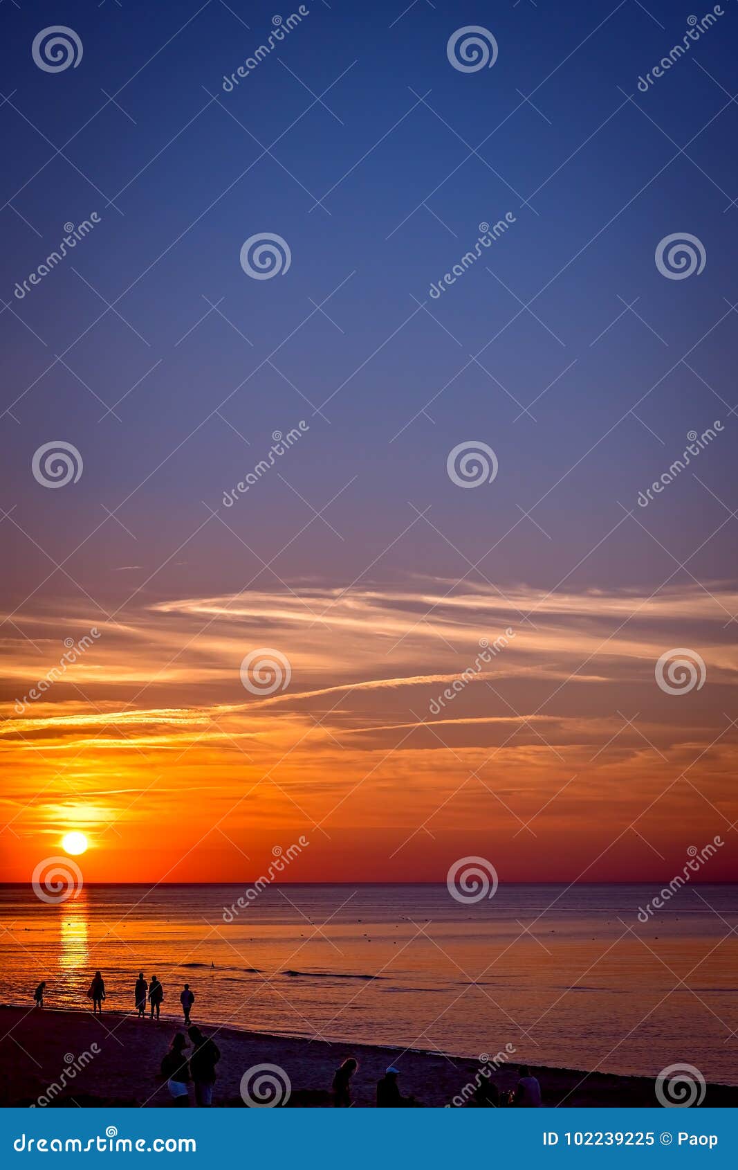 People on the Beach at Sunset Stock Image - Image of relaxing, scenic ...