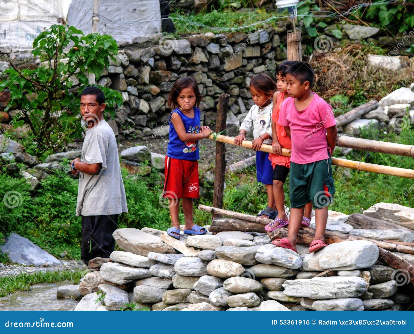 People in Besisahar, Nepal editorial photo. Image of water - 53361916