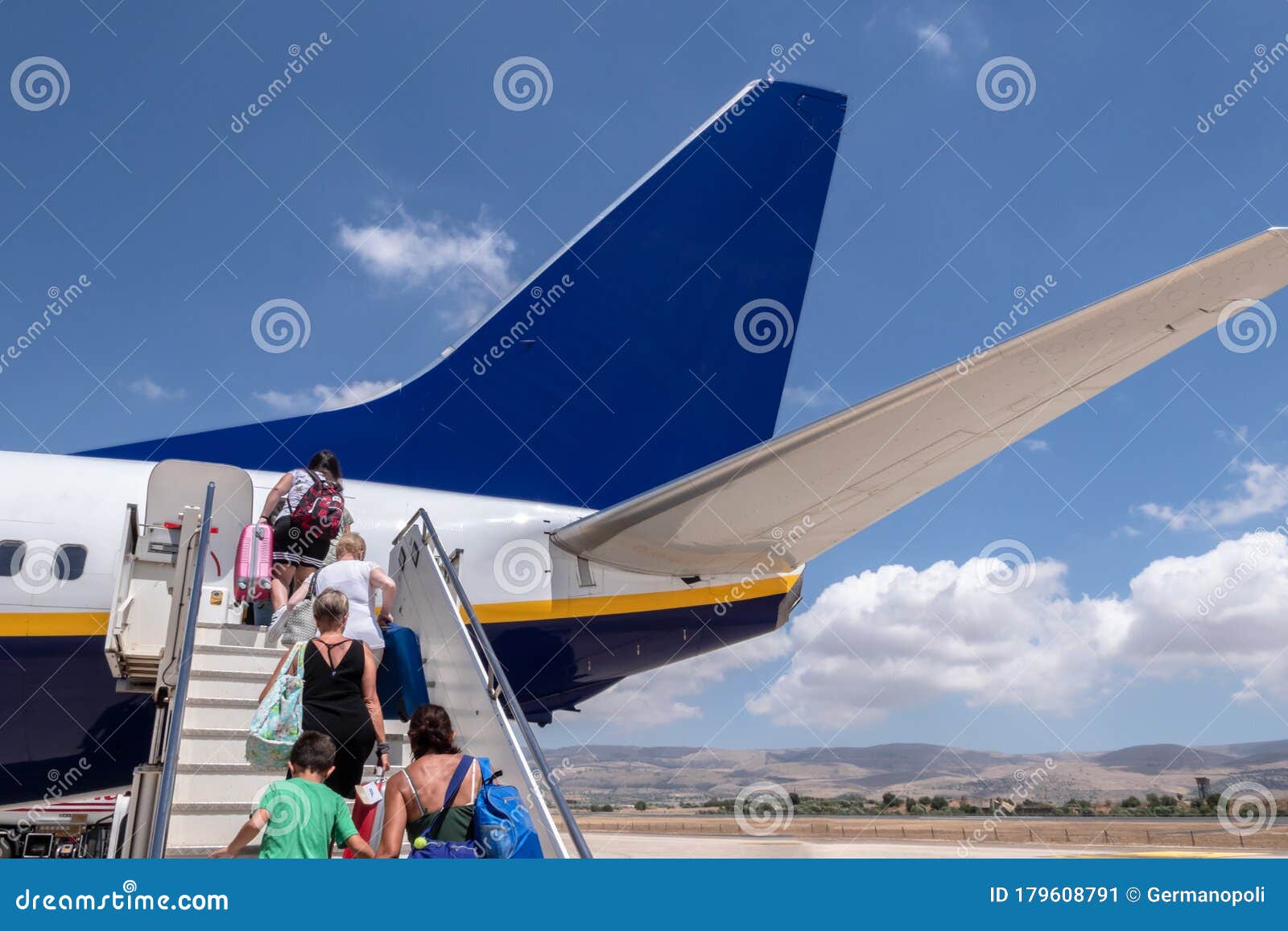 People board a plane editorial photo. Image of coronavirus - 179608791