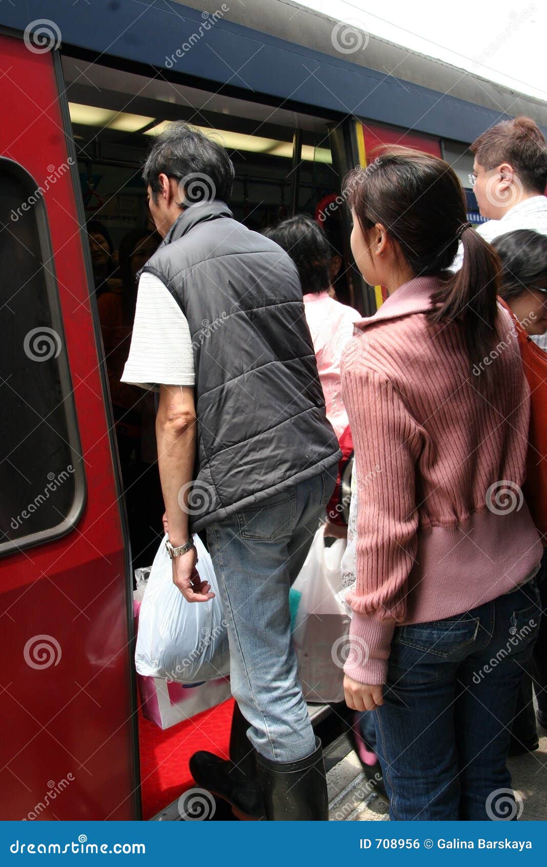 People boarding a train editorial photo. Image of commuter - 708956