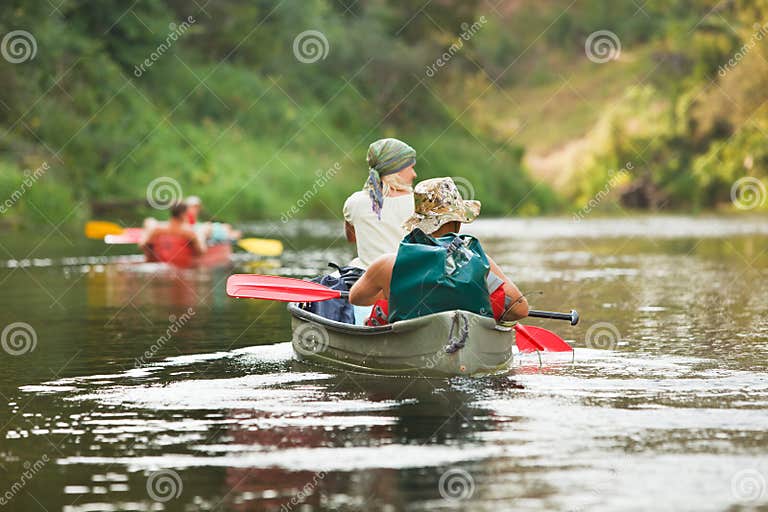 People boating on river stock image. Image of pond, canoe - 15616295