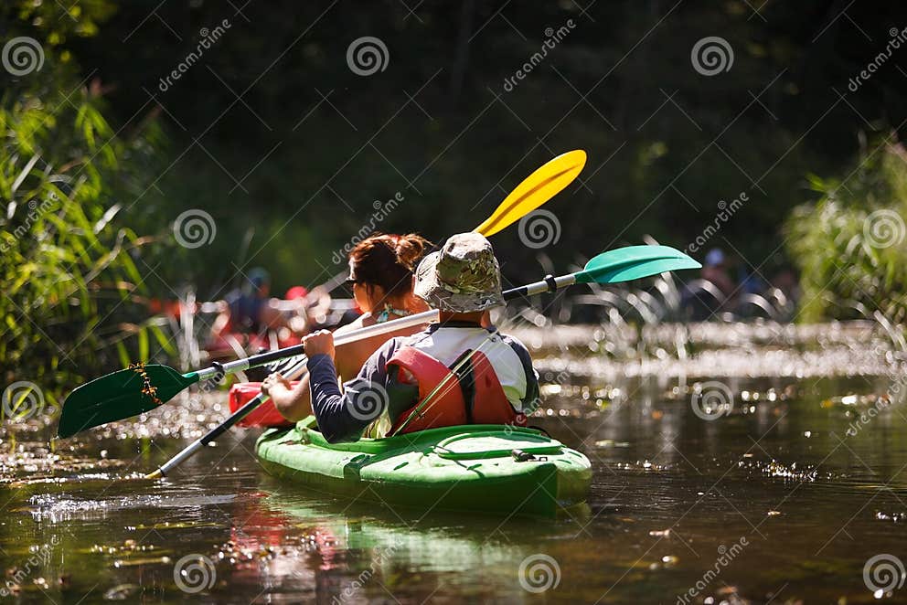 People boating on river stock image. Image of family - 61970071