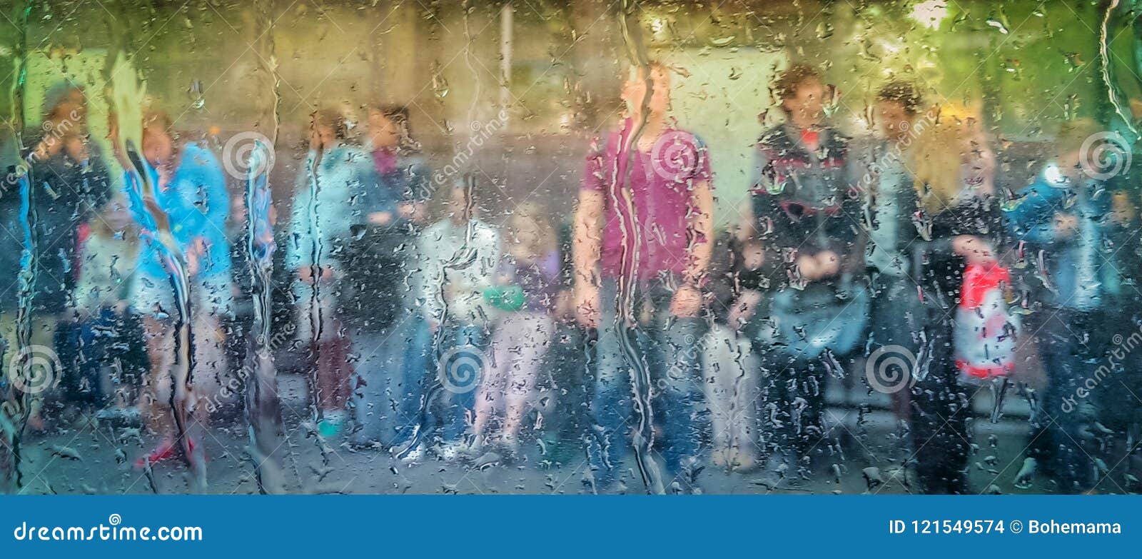 People at the Bus Stop during the Rain Stock Photo - Image of colorful ...