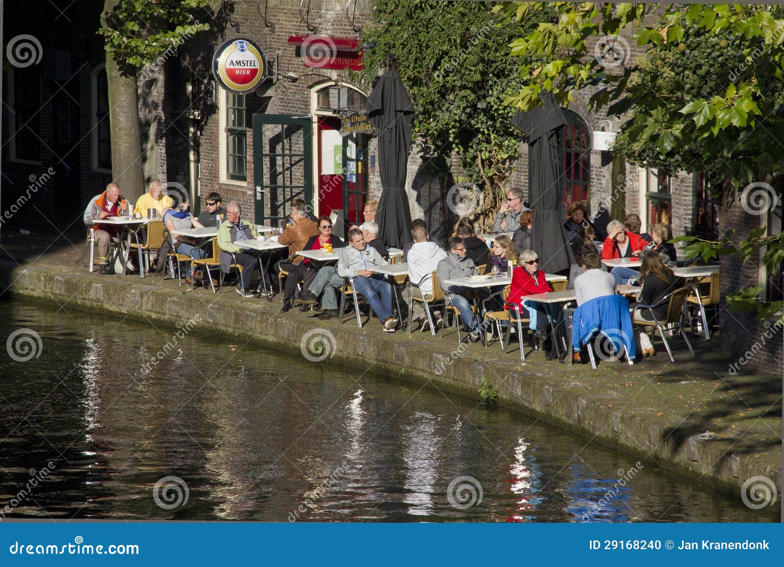 People at a Cafe editorial image. Image of water, sunny - 29168240