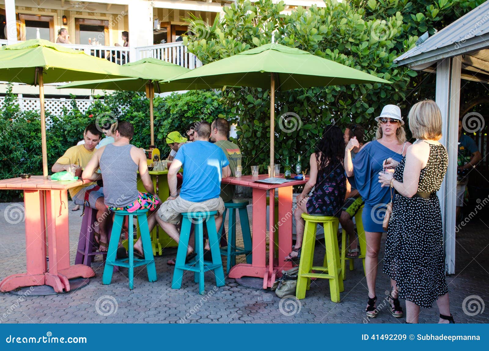People at a cafe outdoors editorial stock image. Image of people - 41492209