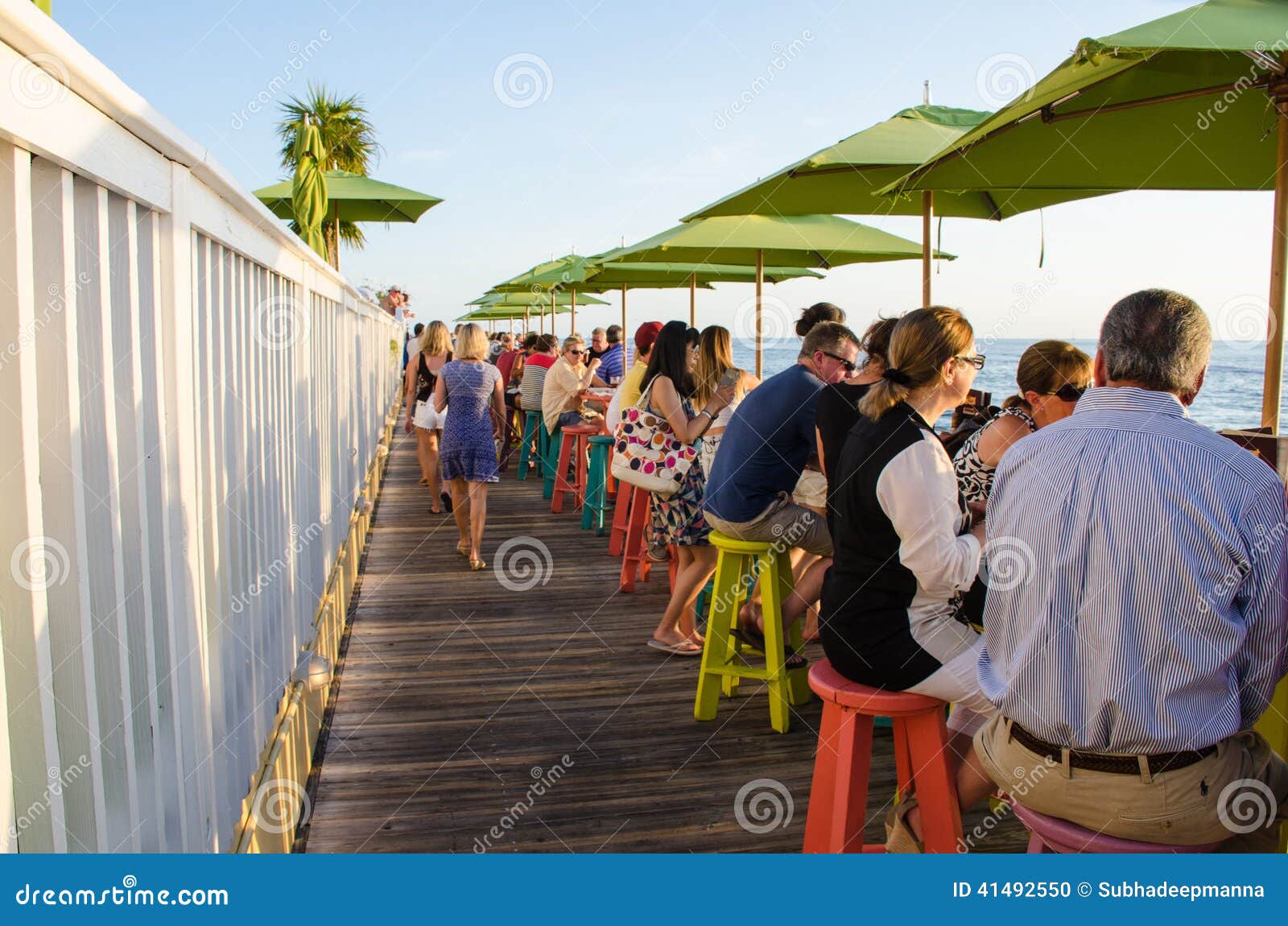 People at a cafe outdoors editorial image. Image of walking - 41492550