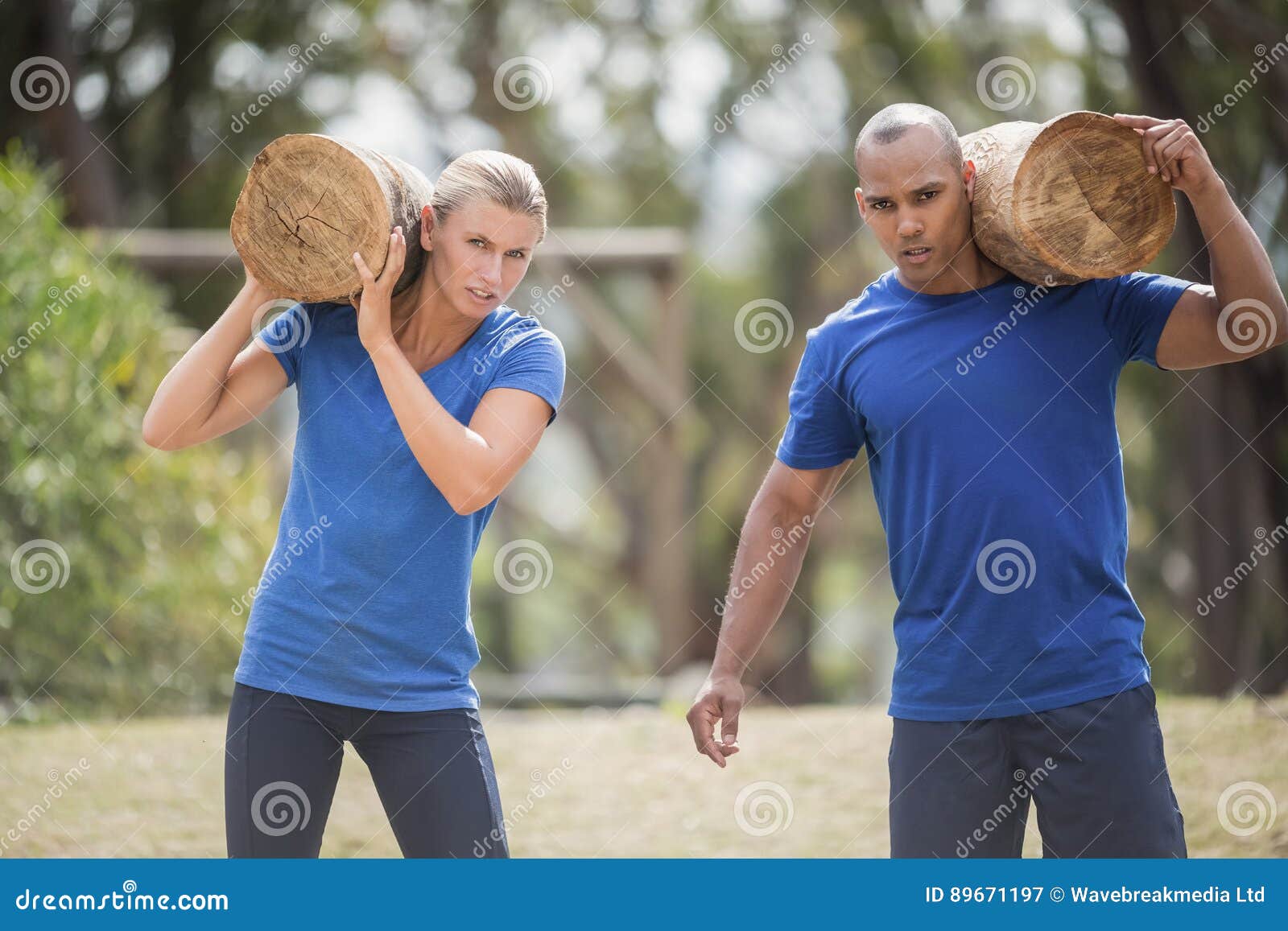 People Carrying Heavy Wooden Logs during Obstacle Course Stock Image ...
