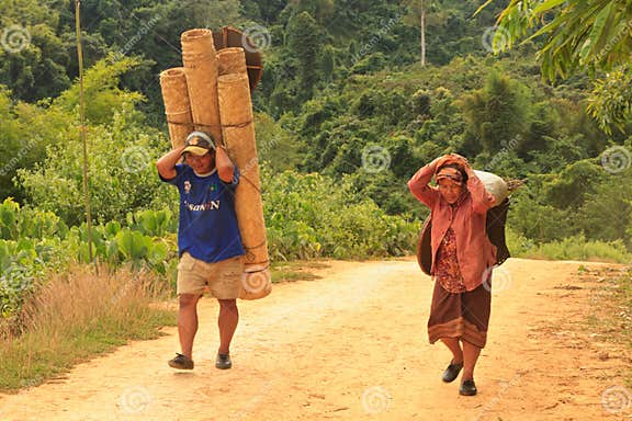 People Carrying Stuff on Their Back Editorial Stock Photo - Image of ...