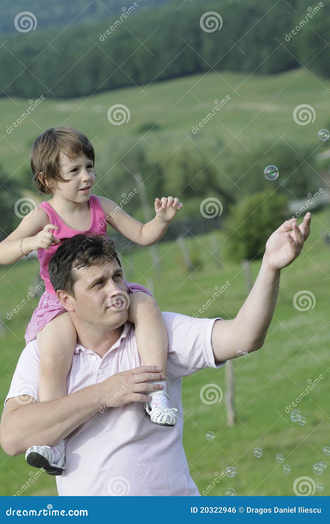 People catching balloons stock photo. Image of family - 20322946