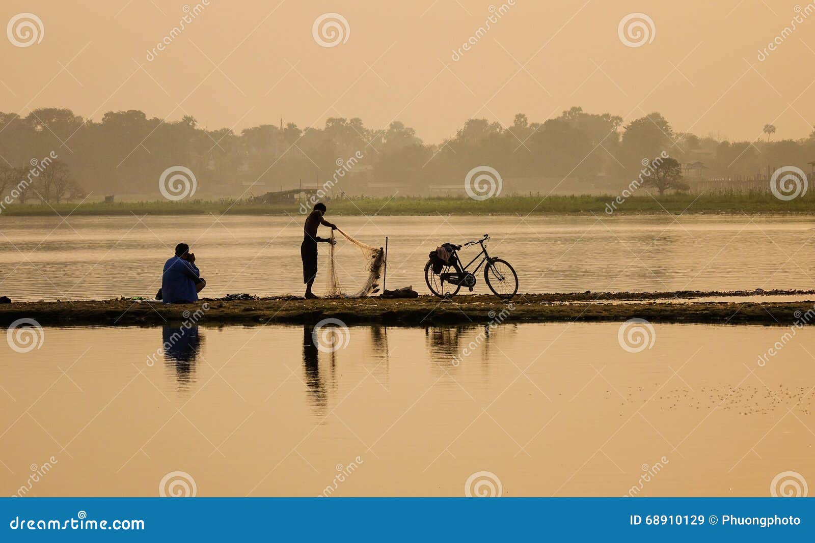 People Catching Crabs With Buckets Lowered From Cromer Pier, Norfolk ...