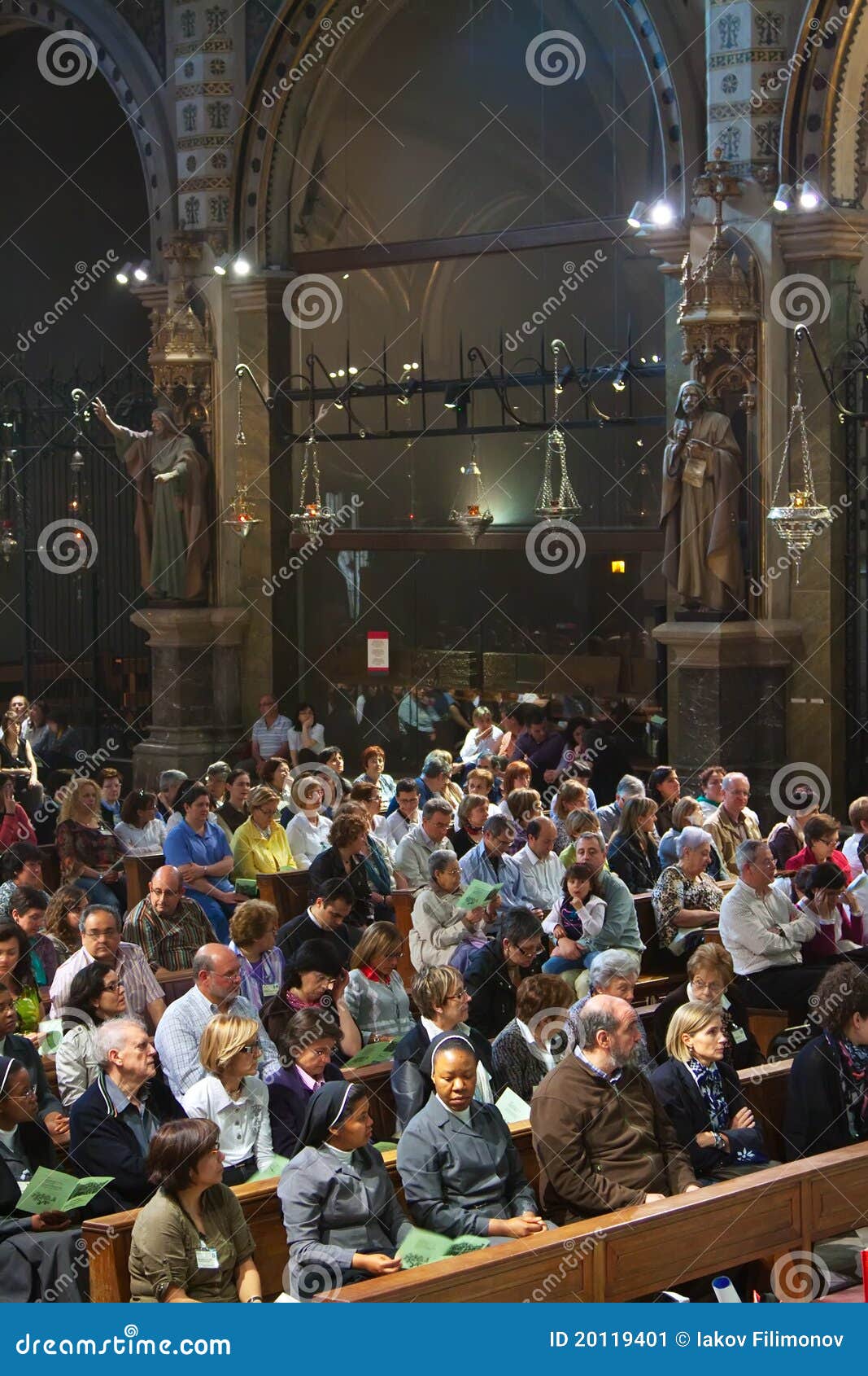 People in catholic church editorial photo. Image of figure - 20119401
