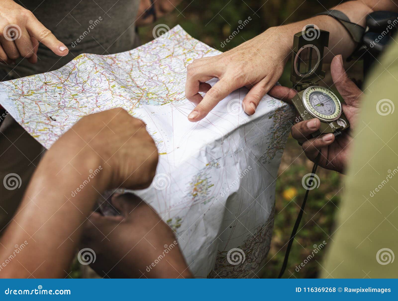 People Checking on the Map for Directions Stock Photo - Image of ...