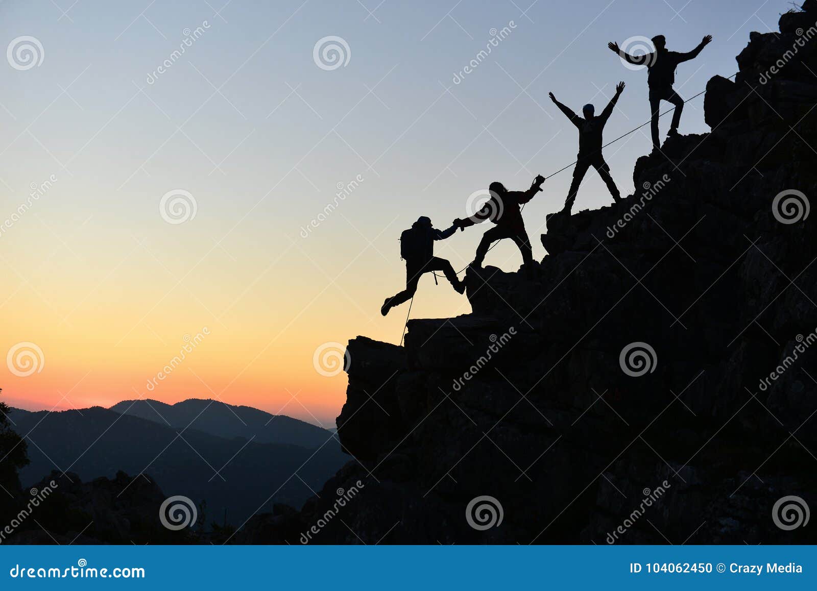 People Climbing Rock at Sunset Stock Photo - Image of climb ...