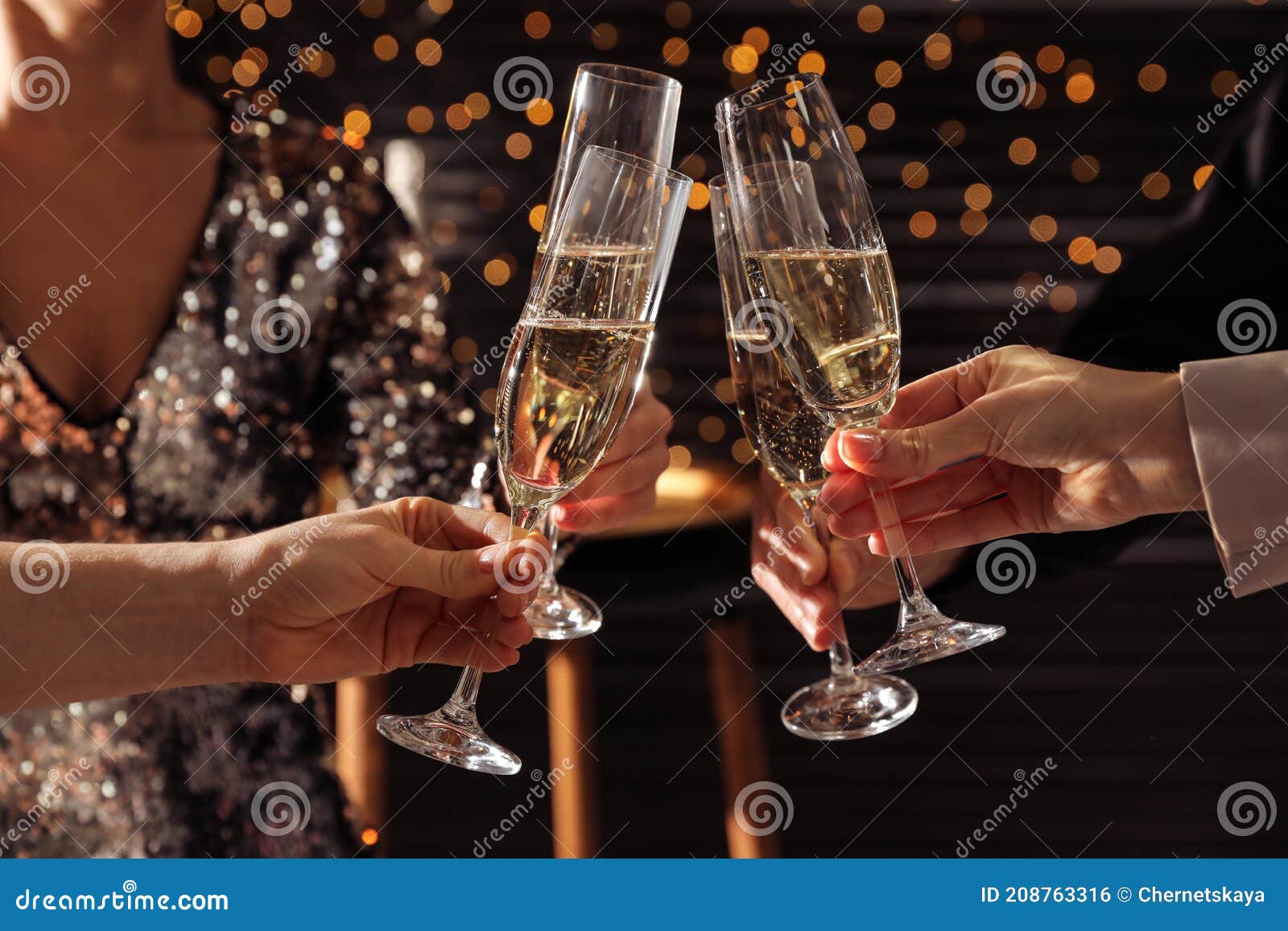 People Clinking Glasses of Champagne Indoors, Closeup Stock Photo ...