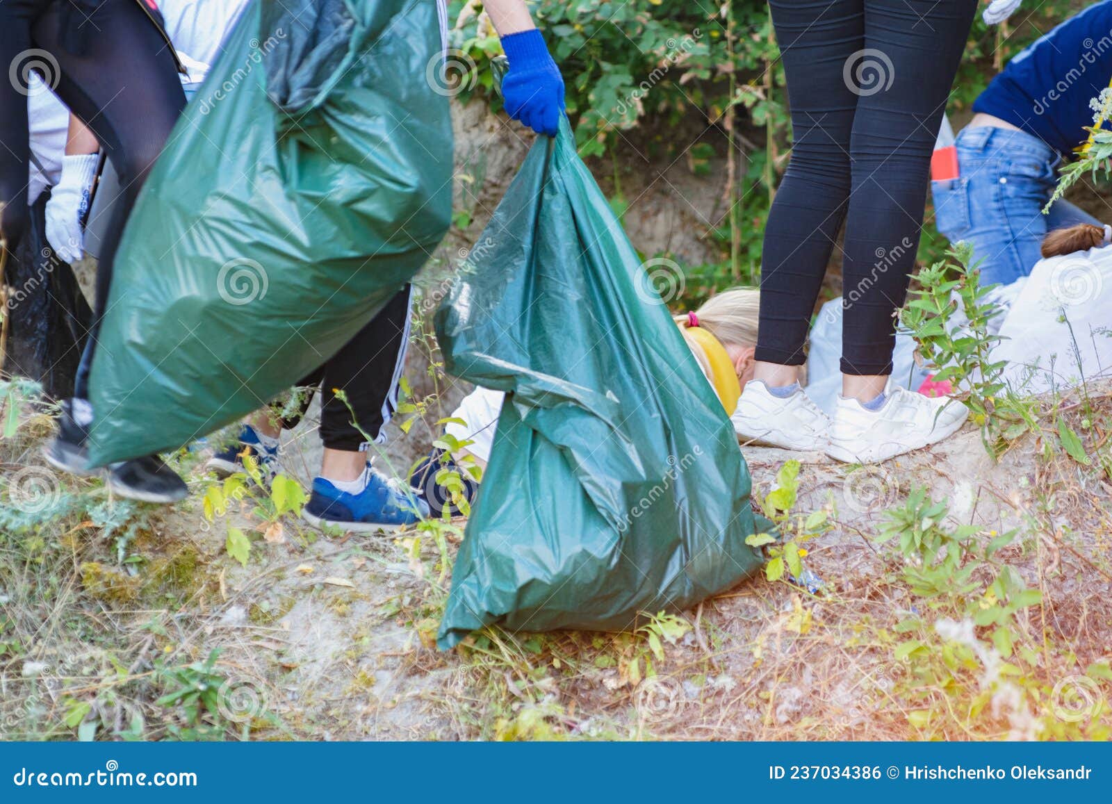 People Collect Garbage in Large Plastic Bags Stock Photo - Image of ...