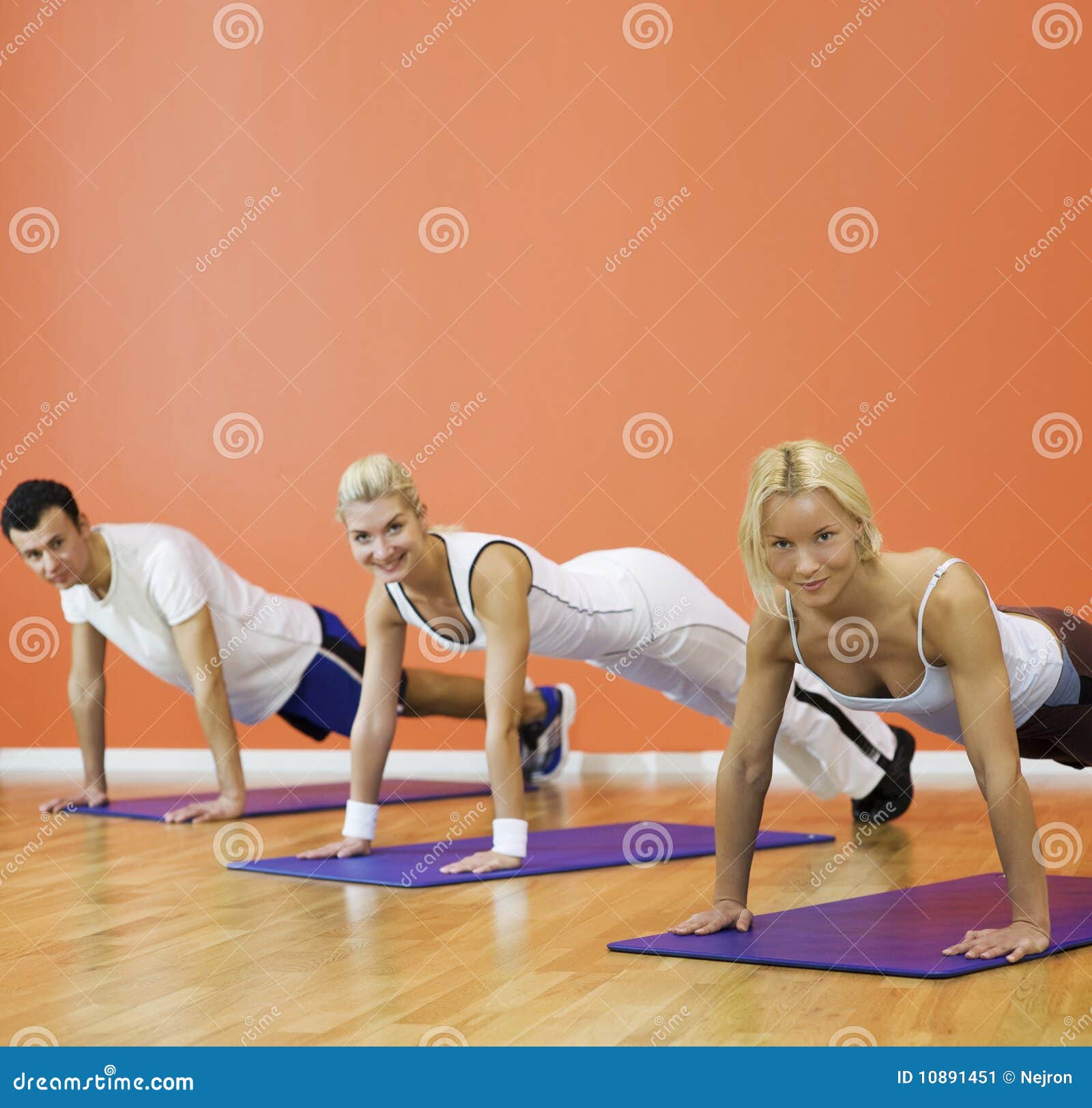 People completing push ups stock image. Image of club - 10891451