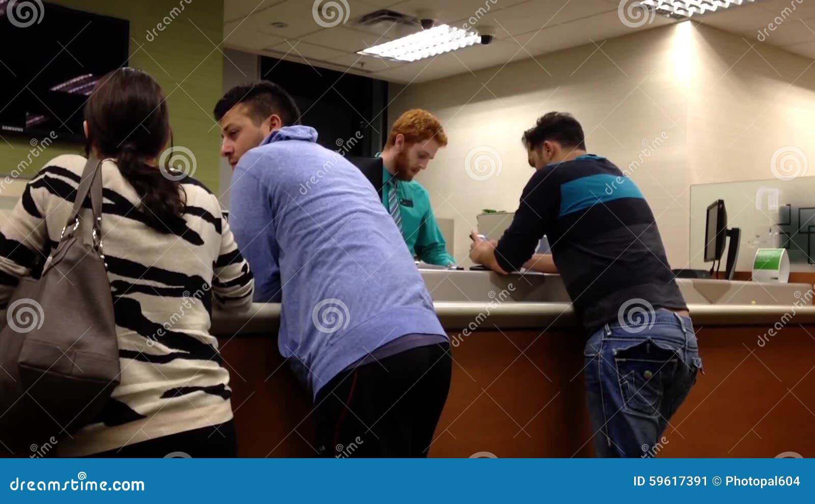 People at Counter Talking To the Teller Stock Video - Video of public ...