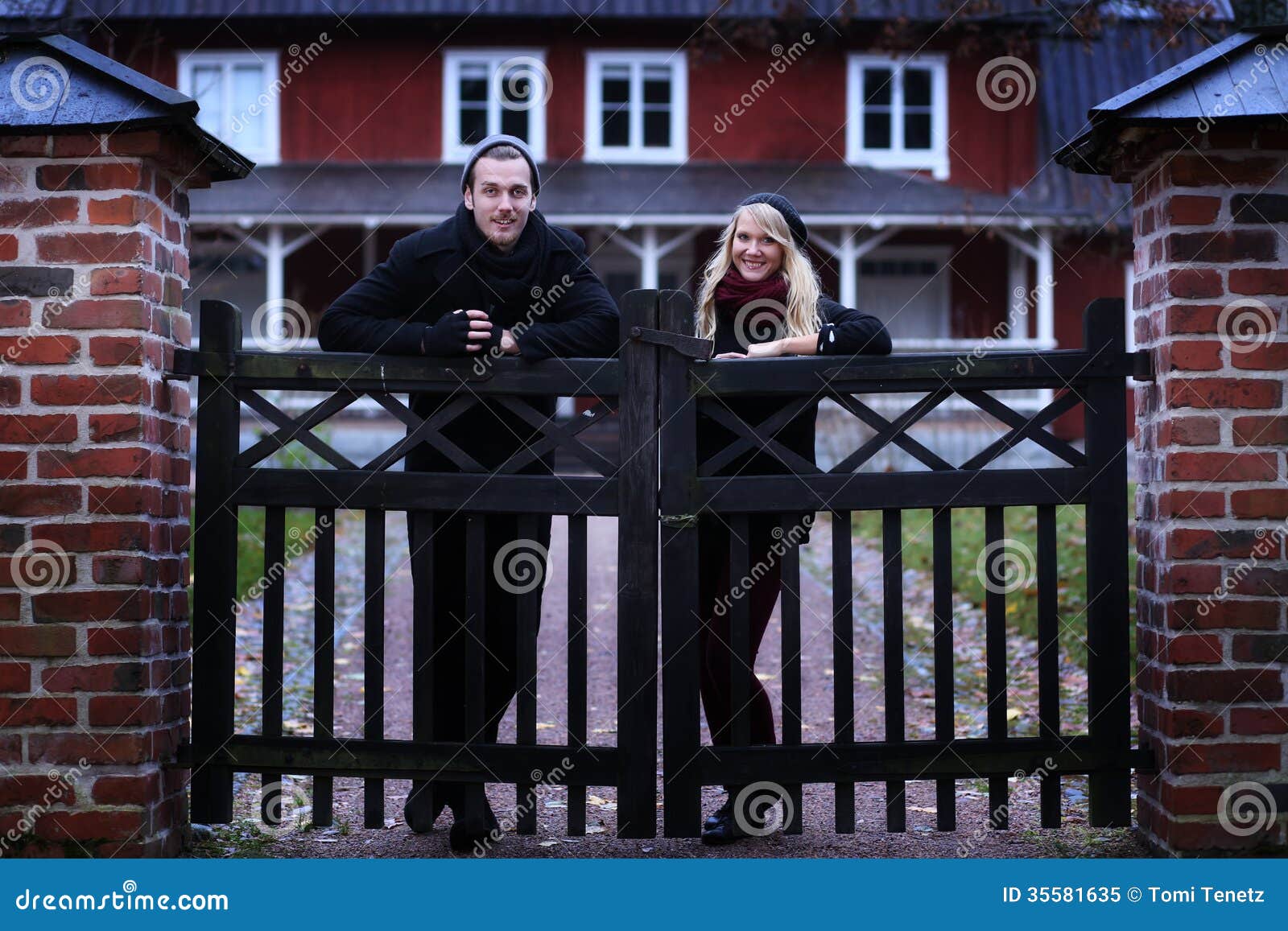 People: Couple in Front of Their House Stock Image - Image of house ...
