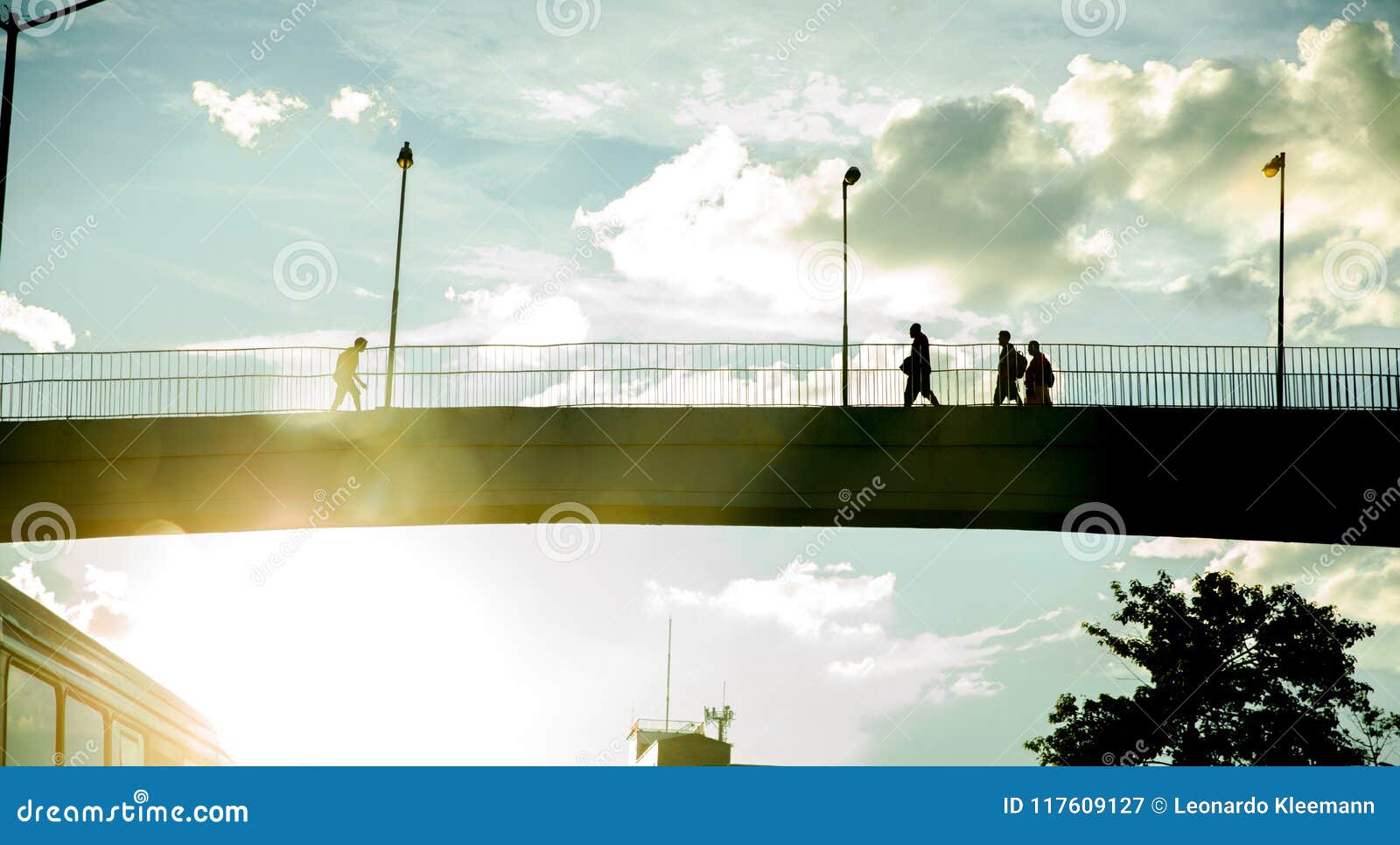 People crossing a bridge stock image. Image of mood - 117609127