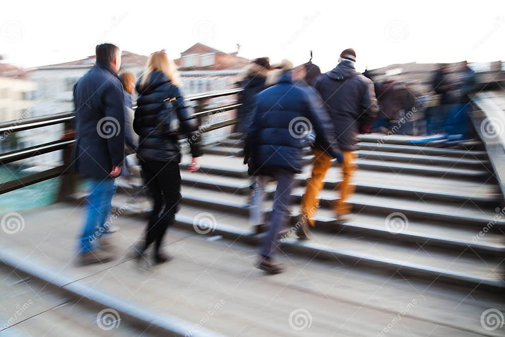 People Crossing a Bridge in Venice Stock Photo - Image of blurred ...
