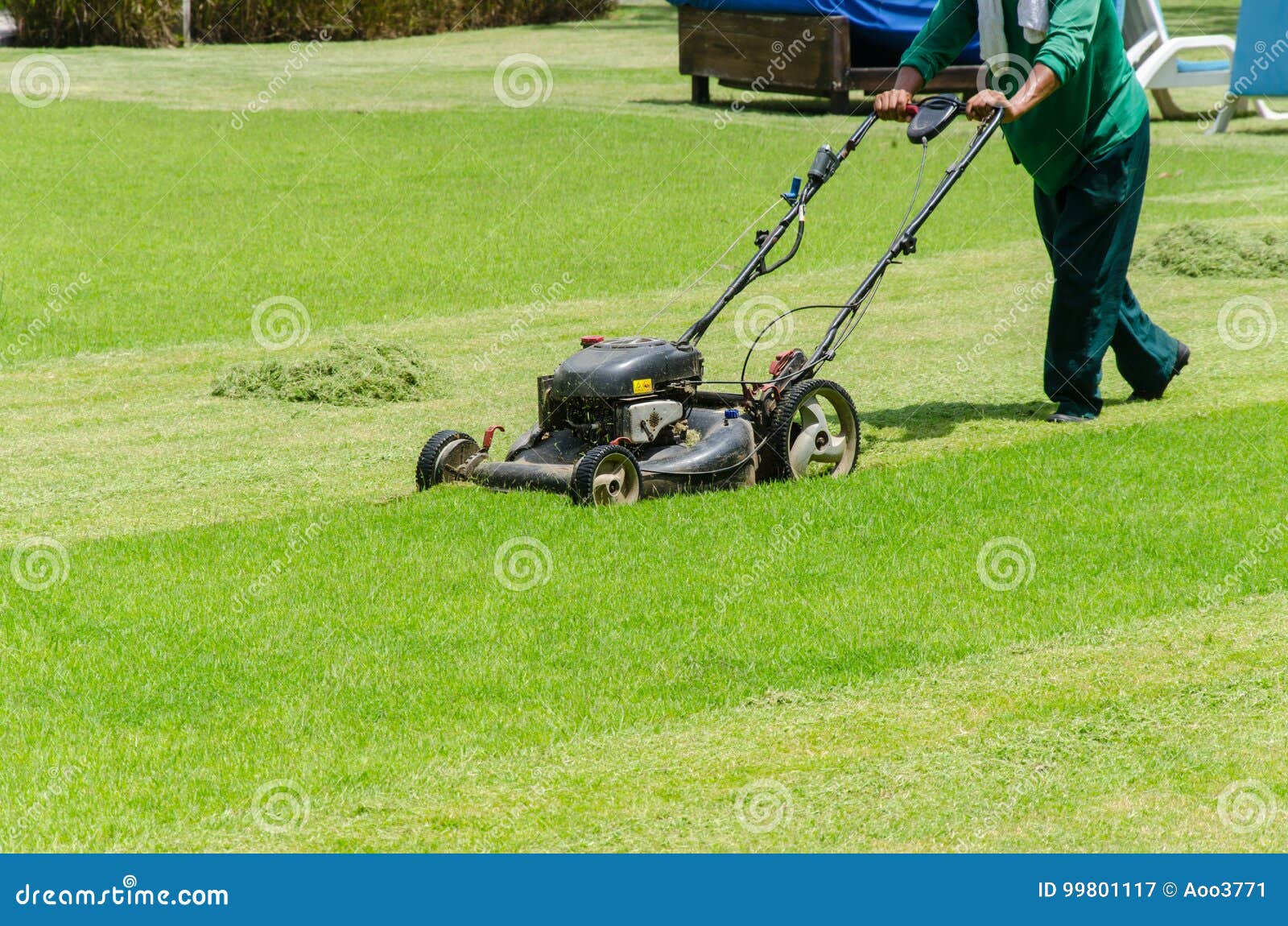 People are cutting grass stock image. Image of summer - 99801117