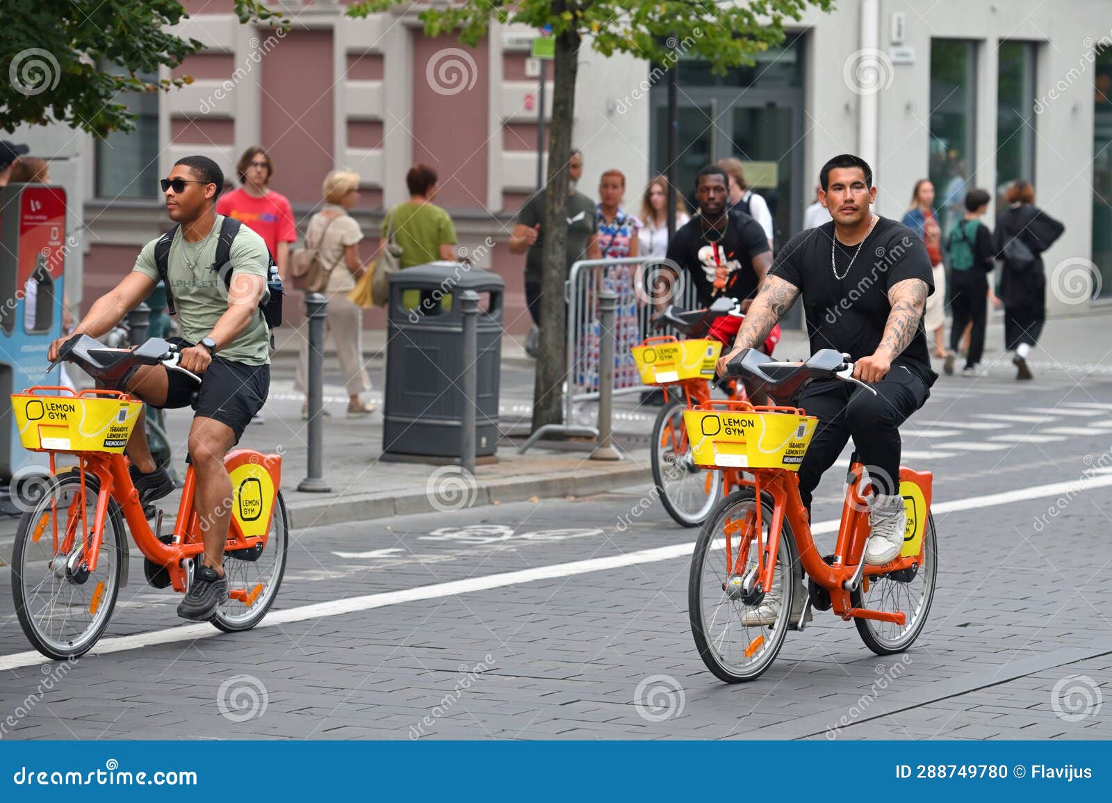 People Cycling in Vilnius Old Town Editorial Image - Image of cyclist ...