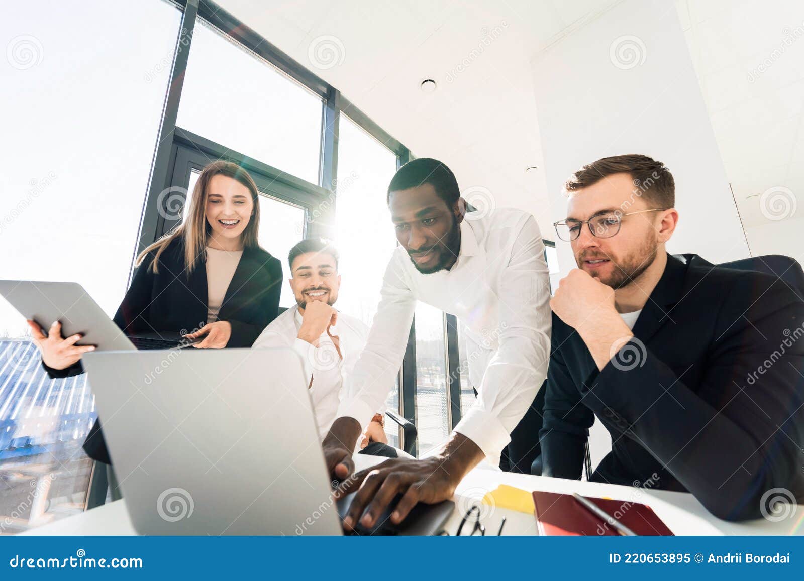 People of Different Ethnic Groups Working Together in the Office on a ...