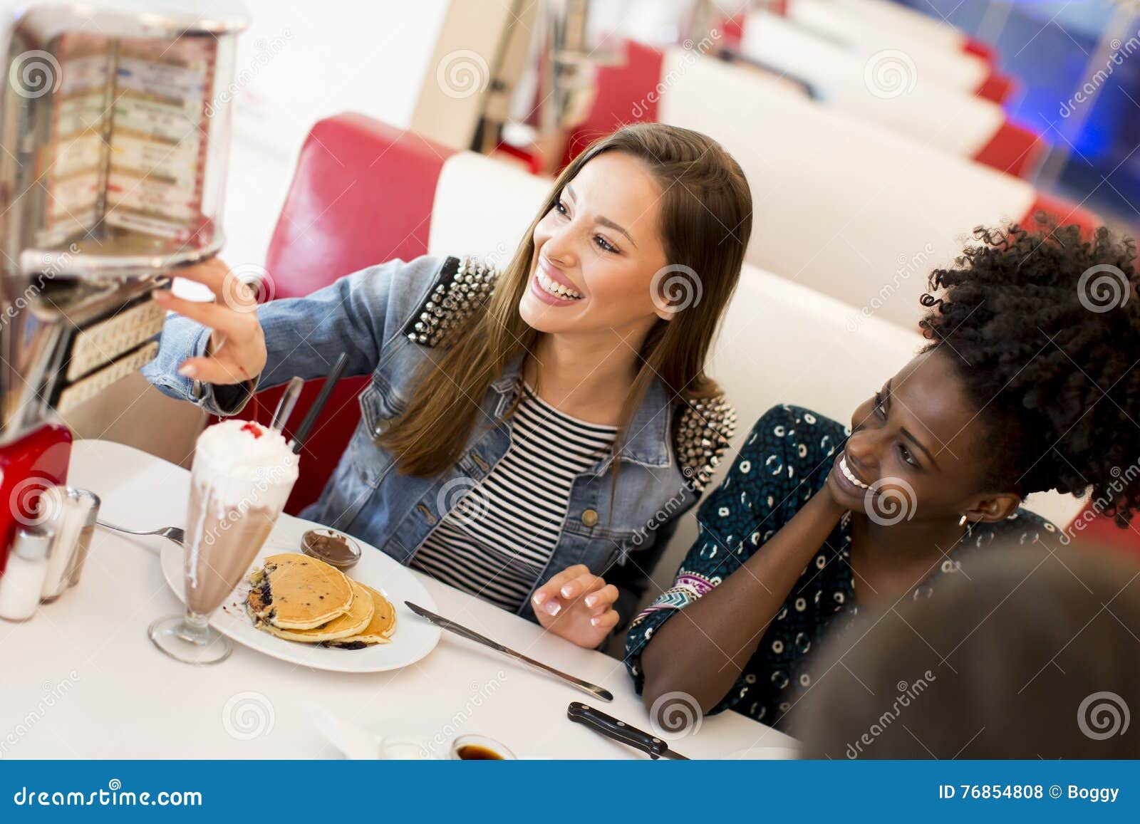 People in diner stock photo. Image of burger, inside - 76854808