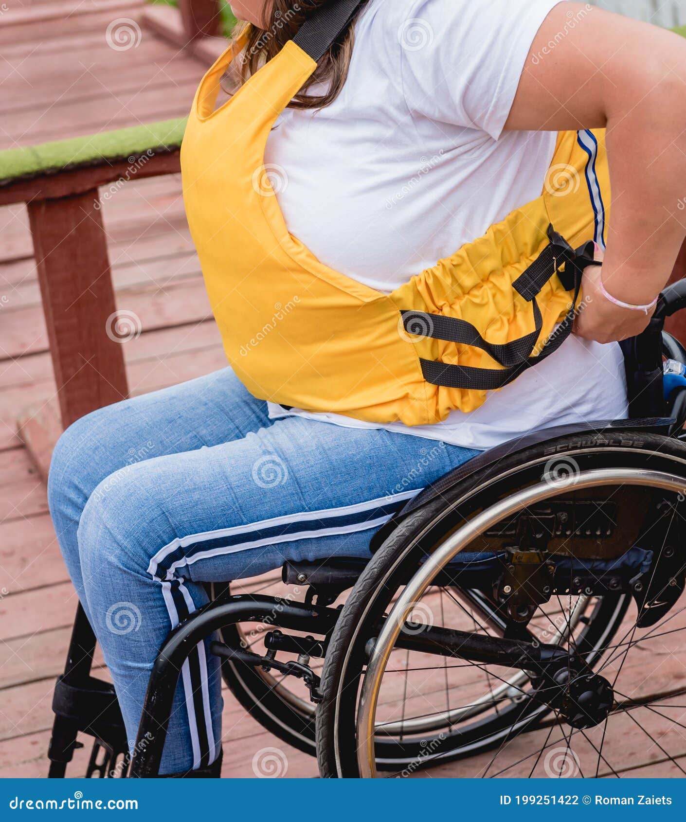 People with Disabilities in Life Vests on the Pier. Stock Photo - Image ...