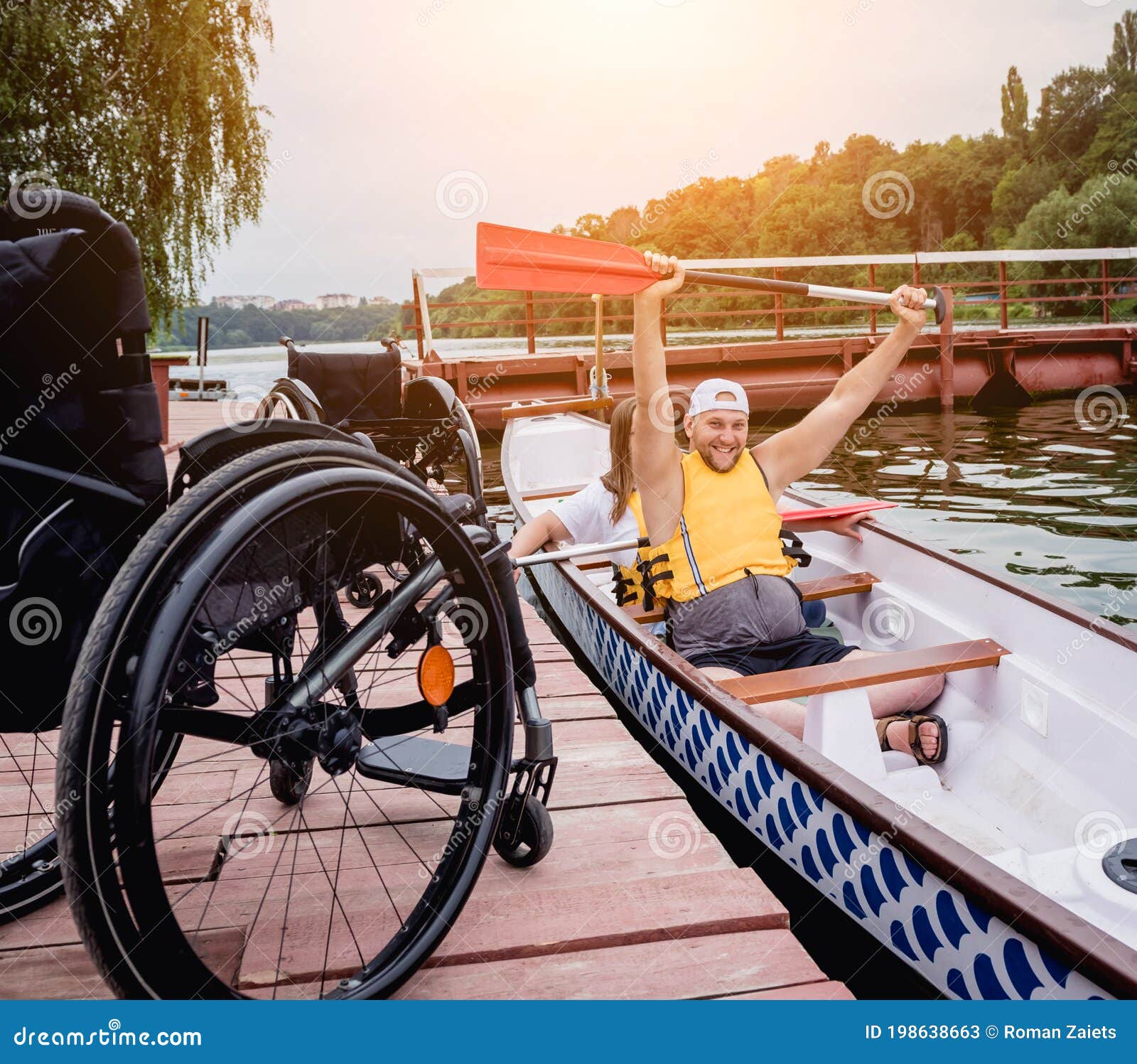 People with Disabilities Sail on a Rowing Boat. Stock Image - Image of ...