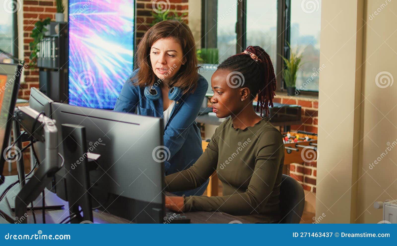 People Doing Teamwork To Develop New Interface in Agency Office Stock ...