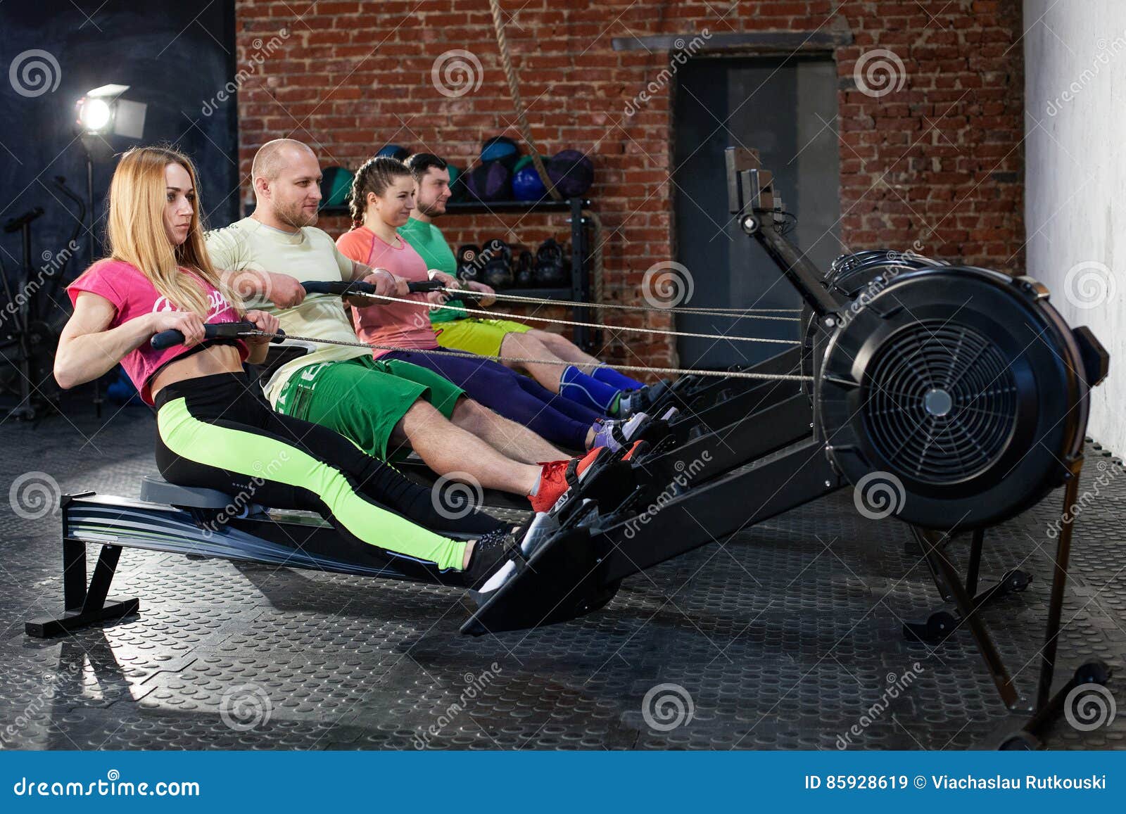 People is Doing Workout on the Rowing Machines Stock Image - Image of ...