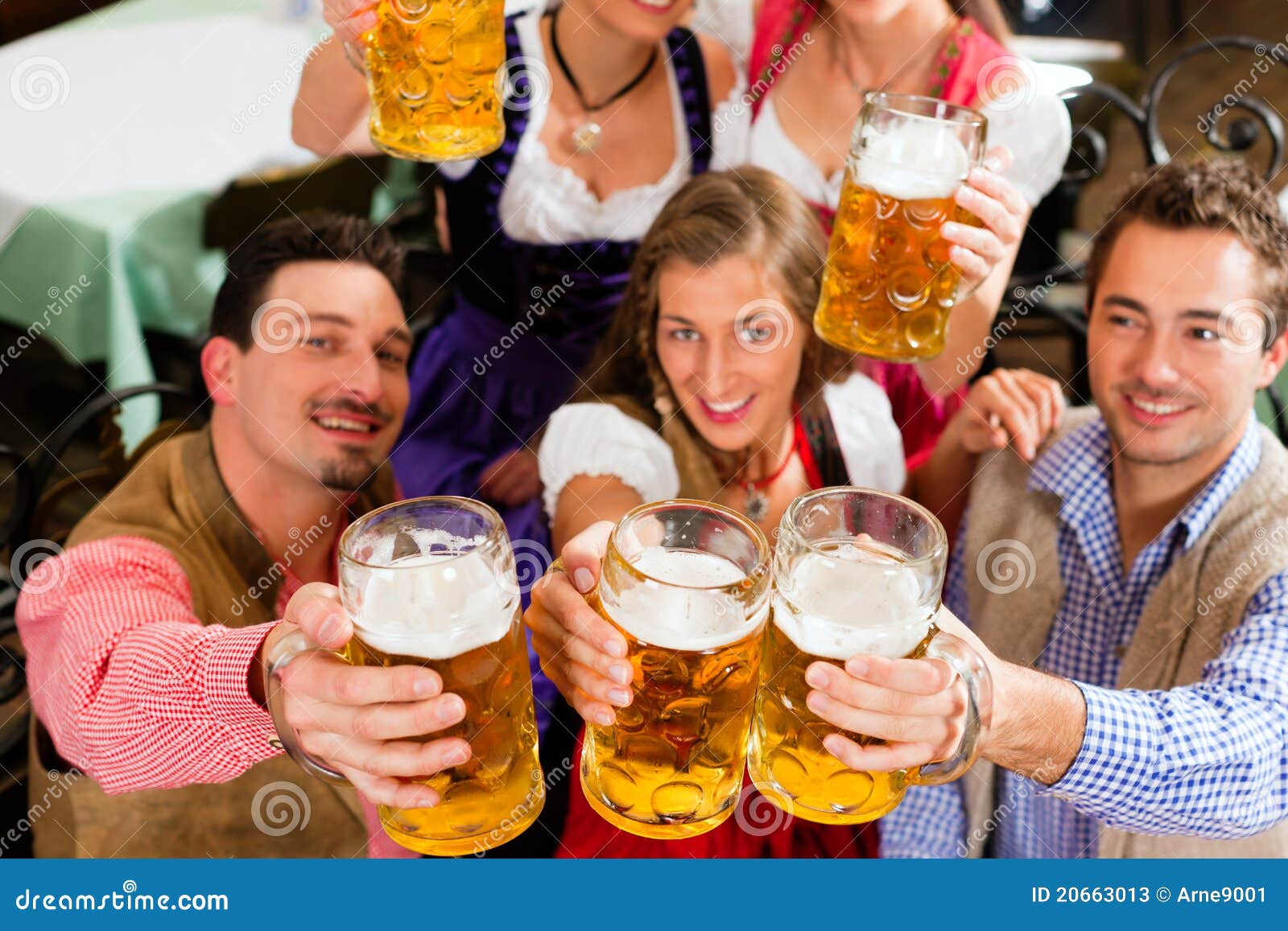 People Drinking Beer in Bavarian Pub Stock Image - Image of glasses ...