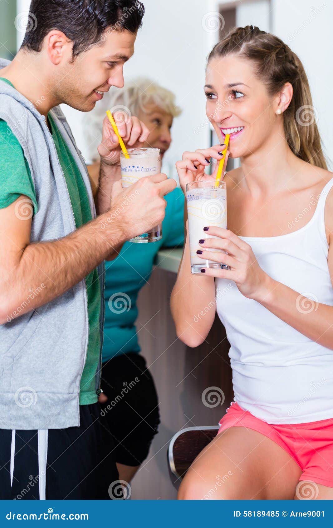 People Drinking Protein Shakes In Fitness Gym Stock Image Image Of
