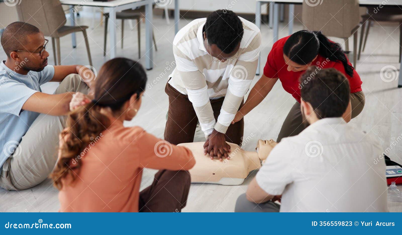 People, Dummy and First Aid in Office for Learning, CPR Workshop or Chest Compression Lesson ...